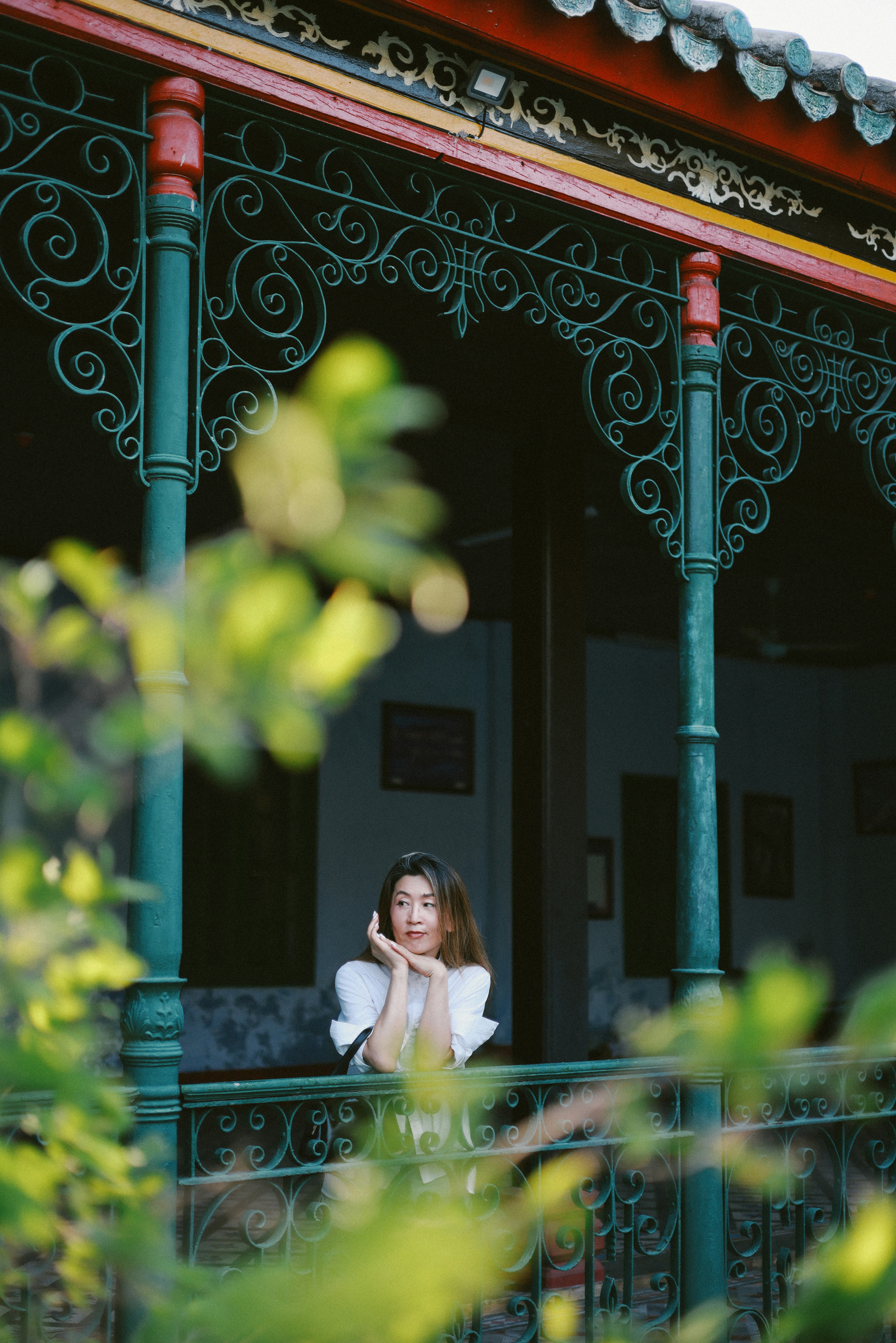 Solitary gaze on a ornate veranda