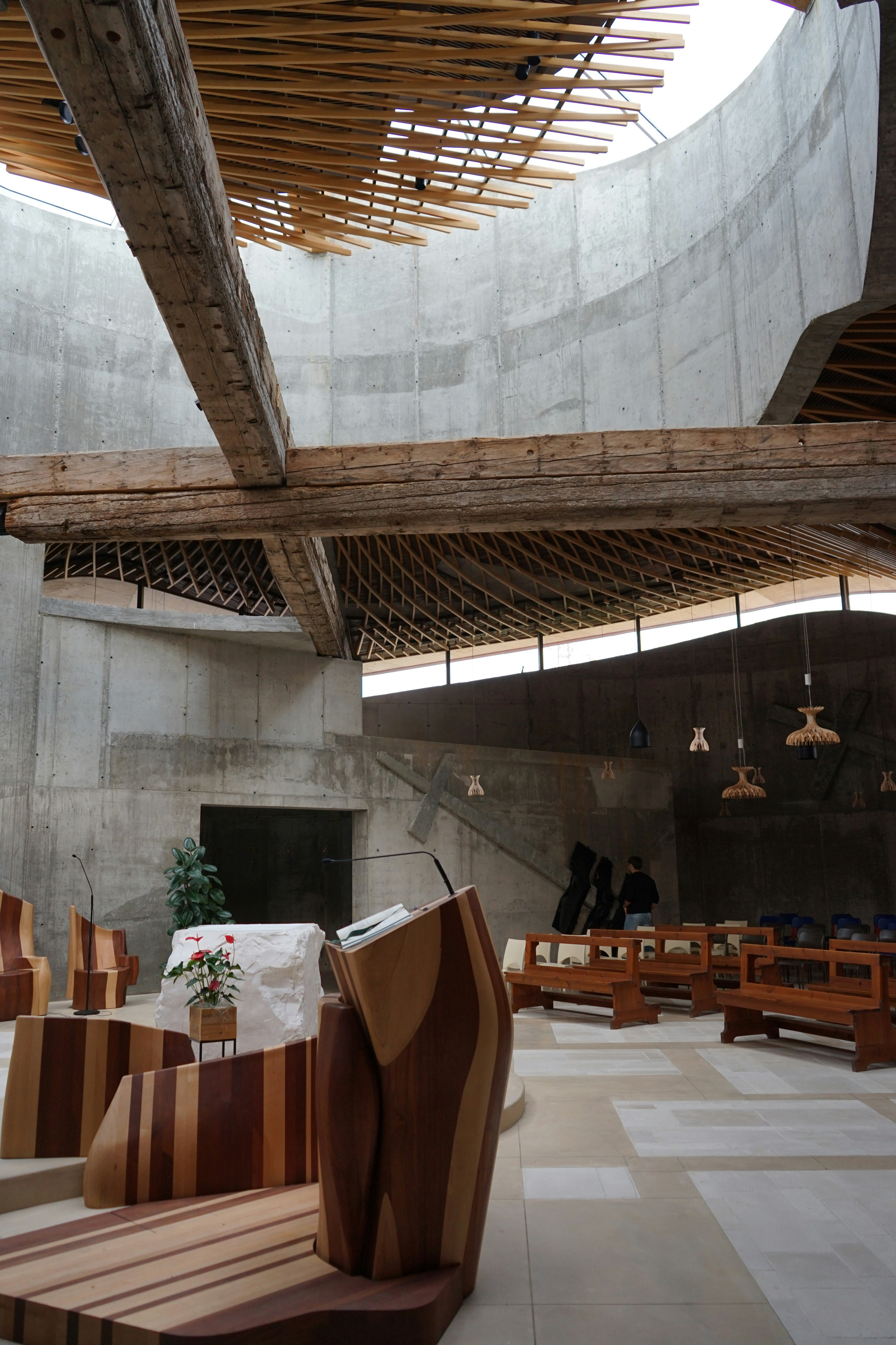 Timber and Concrete Cathedral: A Modern Chapel Under Wooden Skies