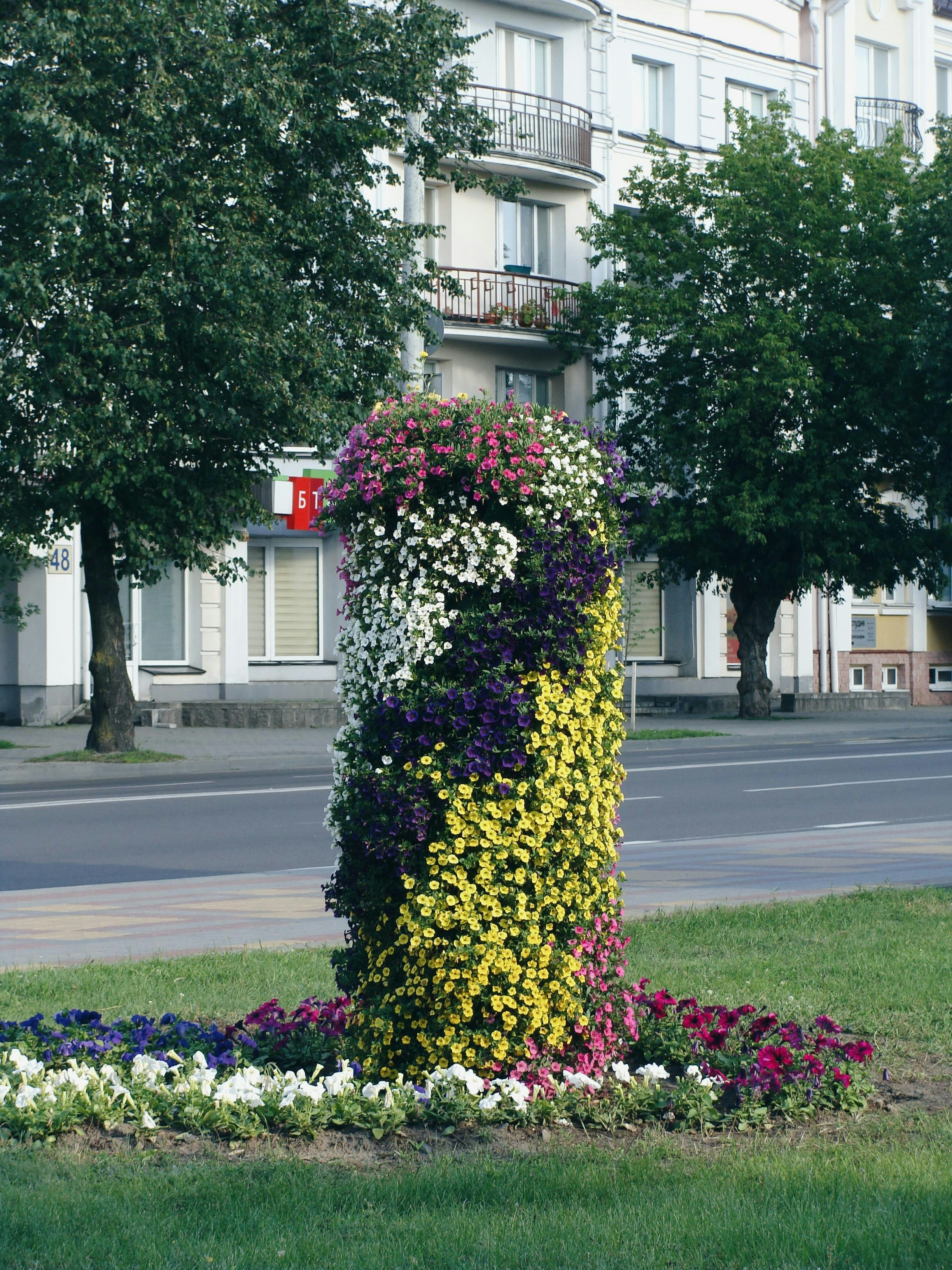 Vertical Flower Column on a City Street