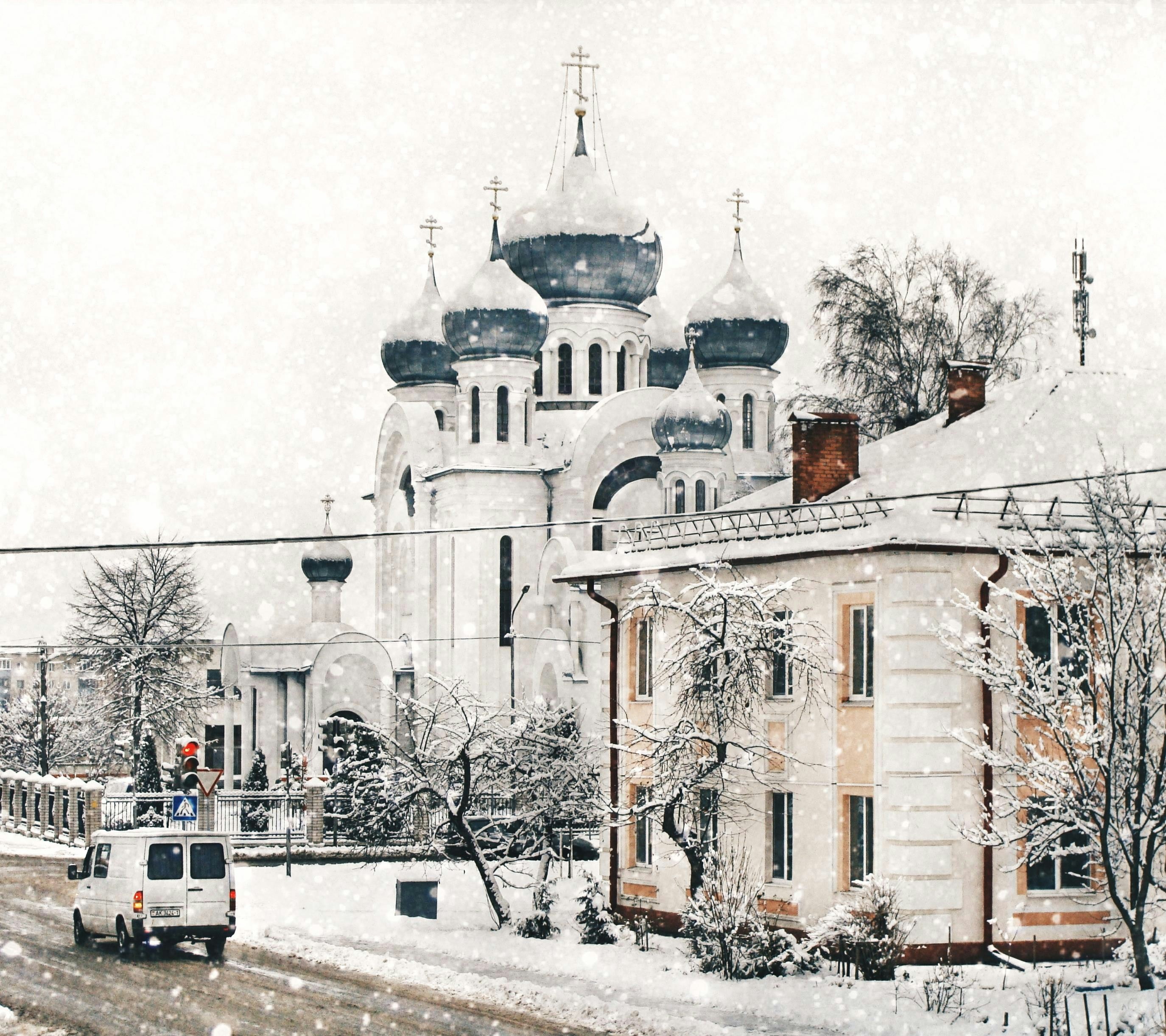 Snow-Cloaked Cathedral Overlooked by a Quiet Street