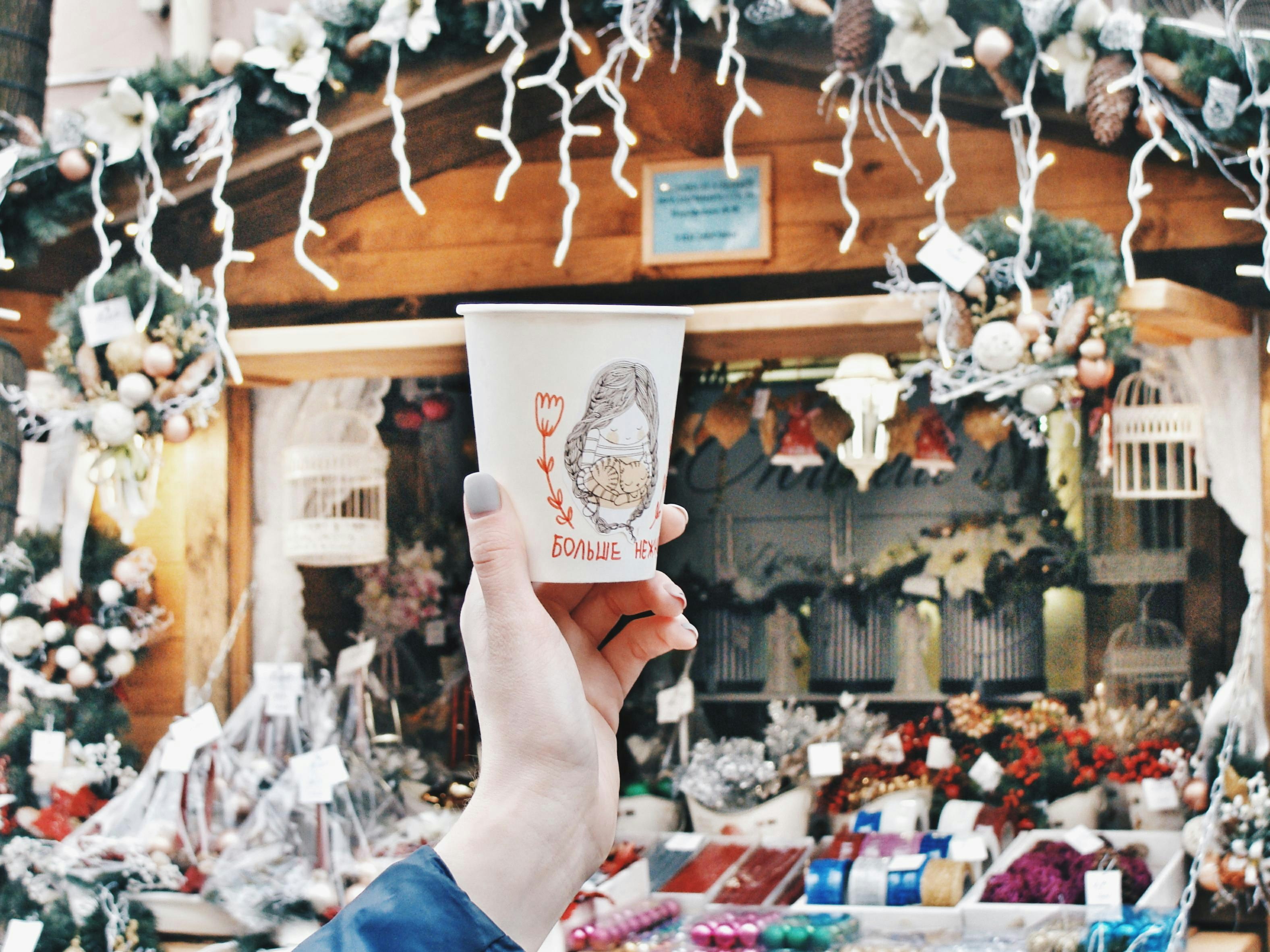 Handheld Cup in a Cozy Winter Market Frame