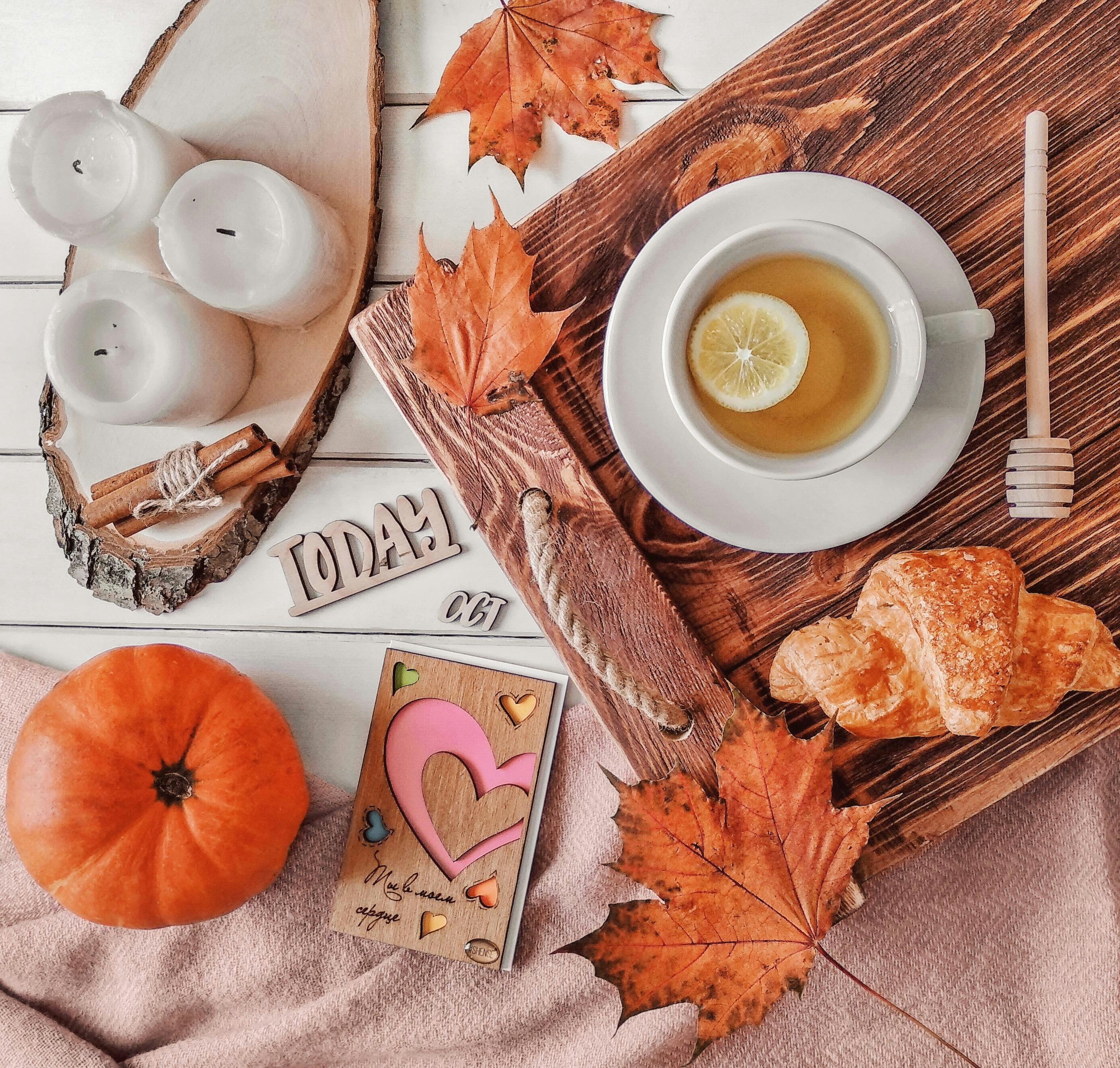 autumn leaves flatlay cup of tea pumpkins food