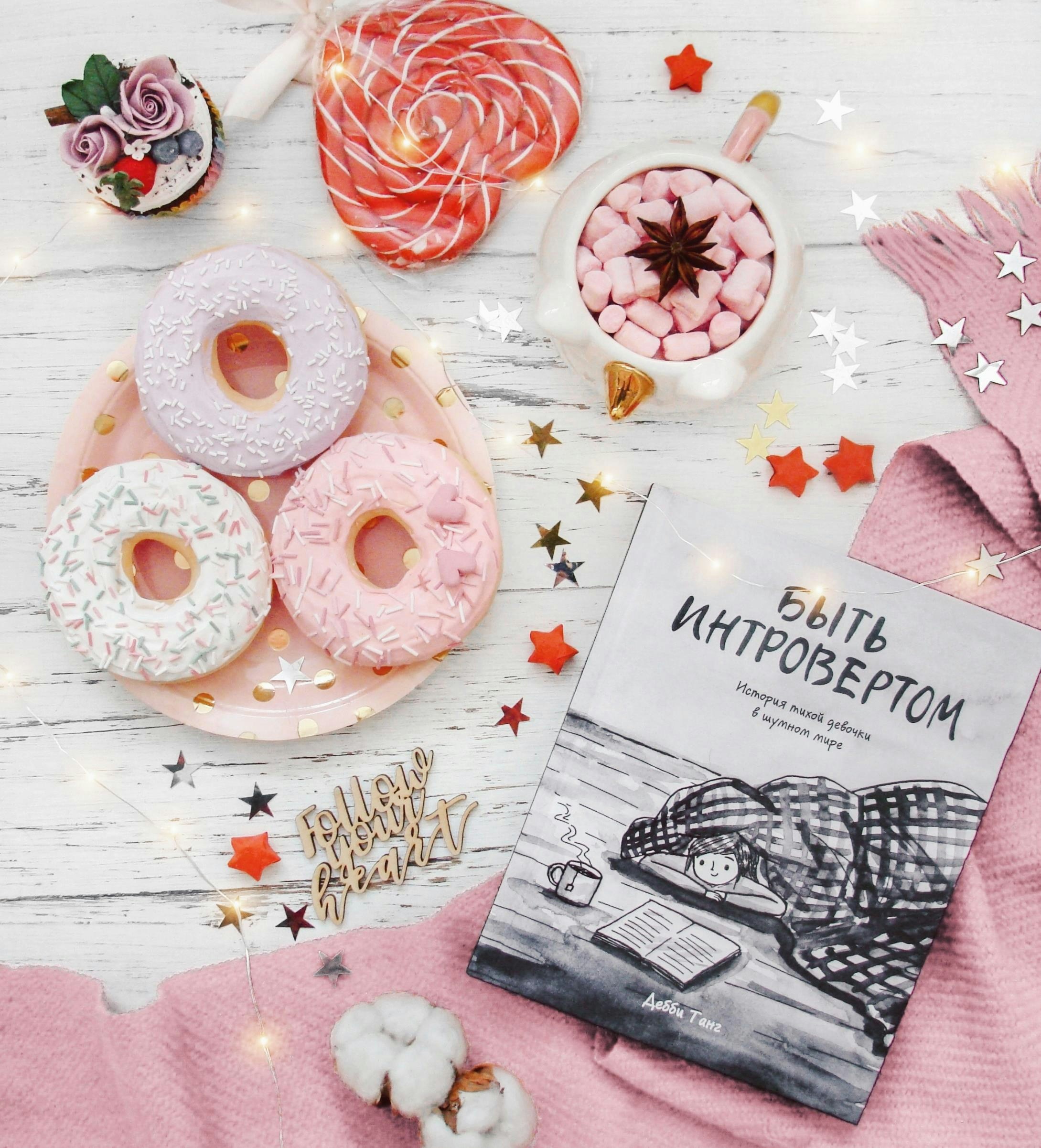 white pink flatlay book