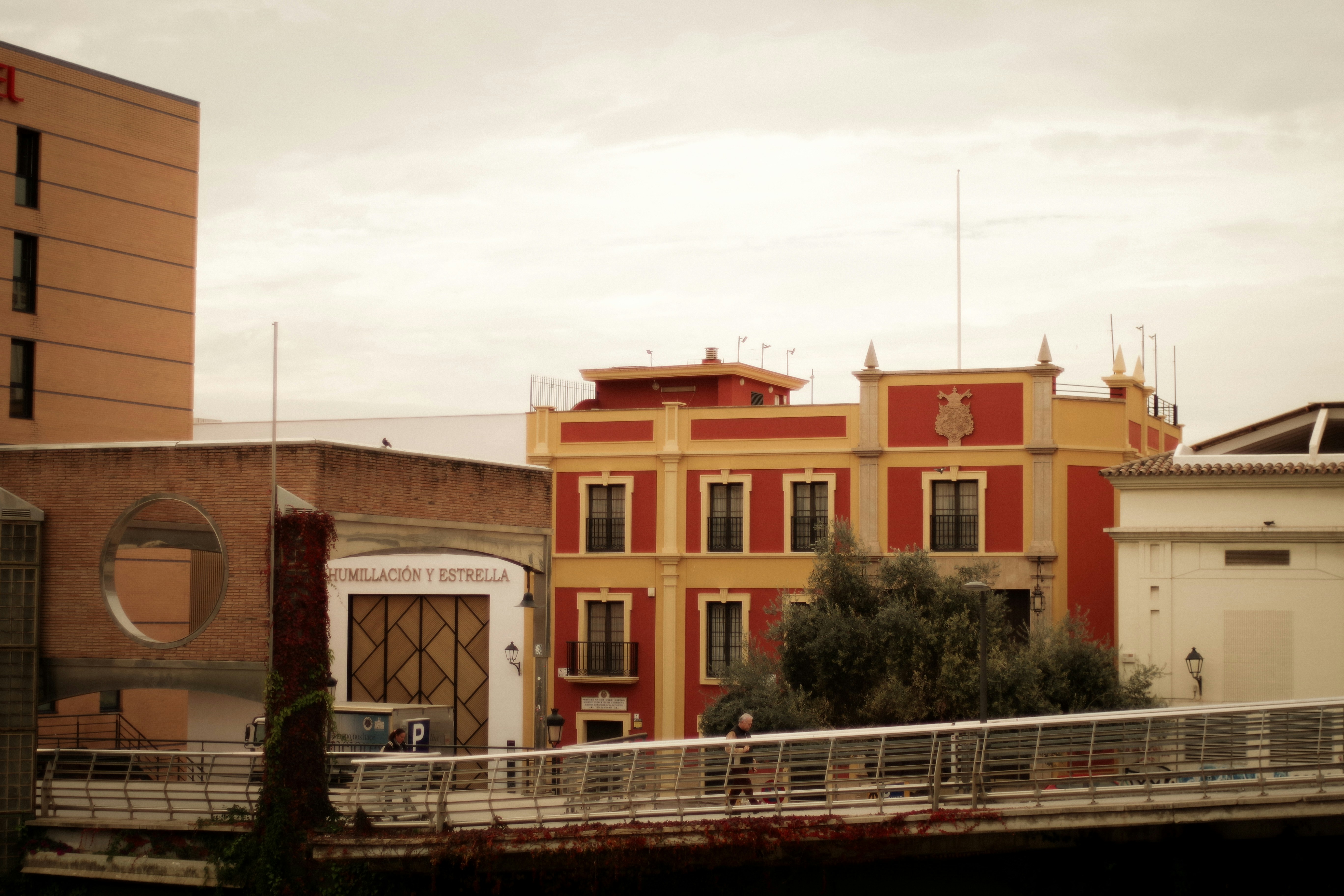 Muted Terrace Overlook: Florid Facades Beneath a Quiet Sky