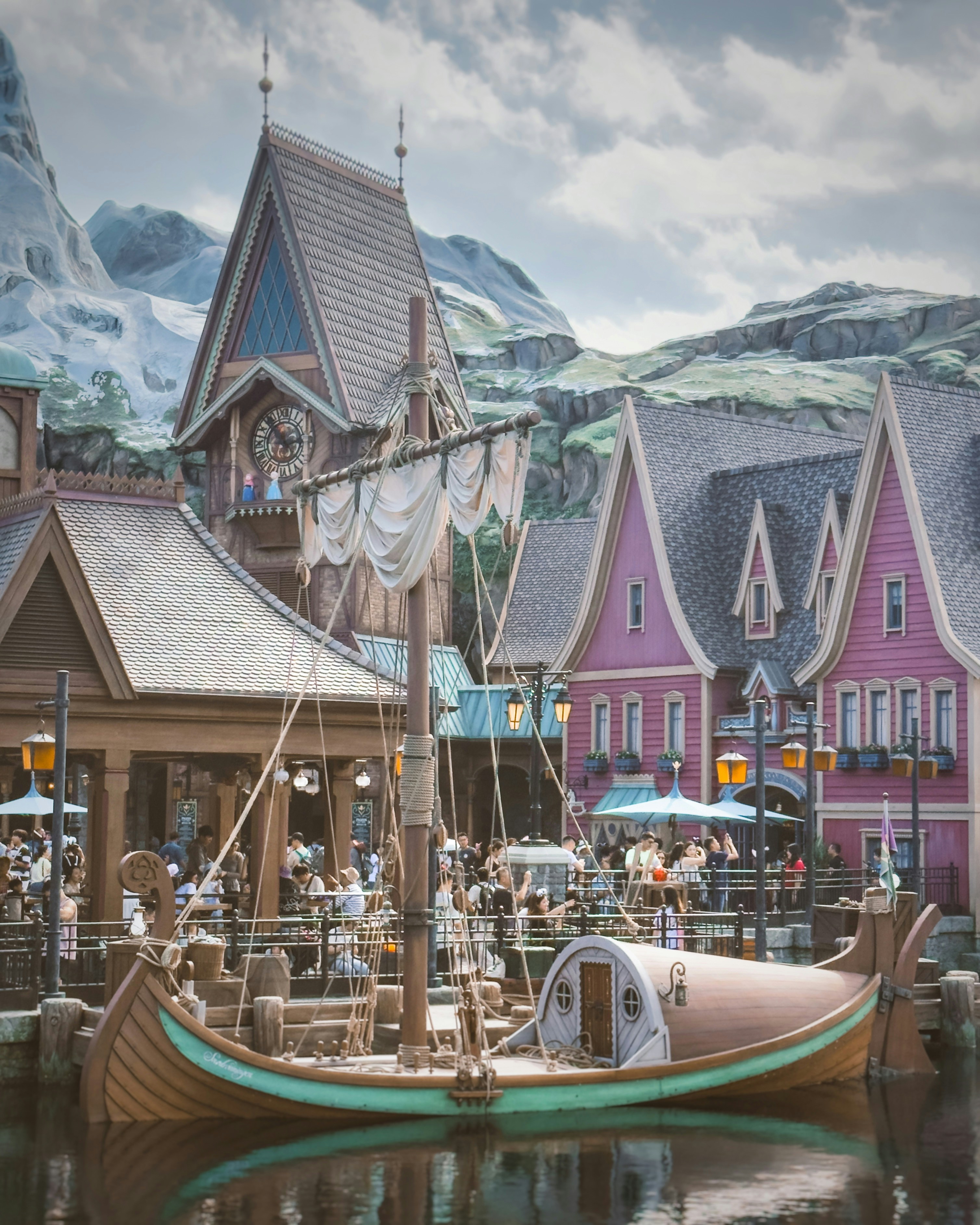 Pastoral Harbor: The Colorful Village of Boats and Peaks
