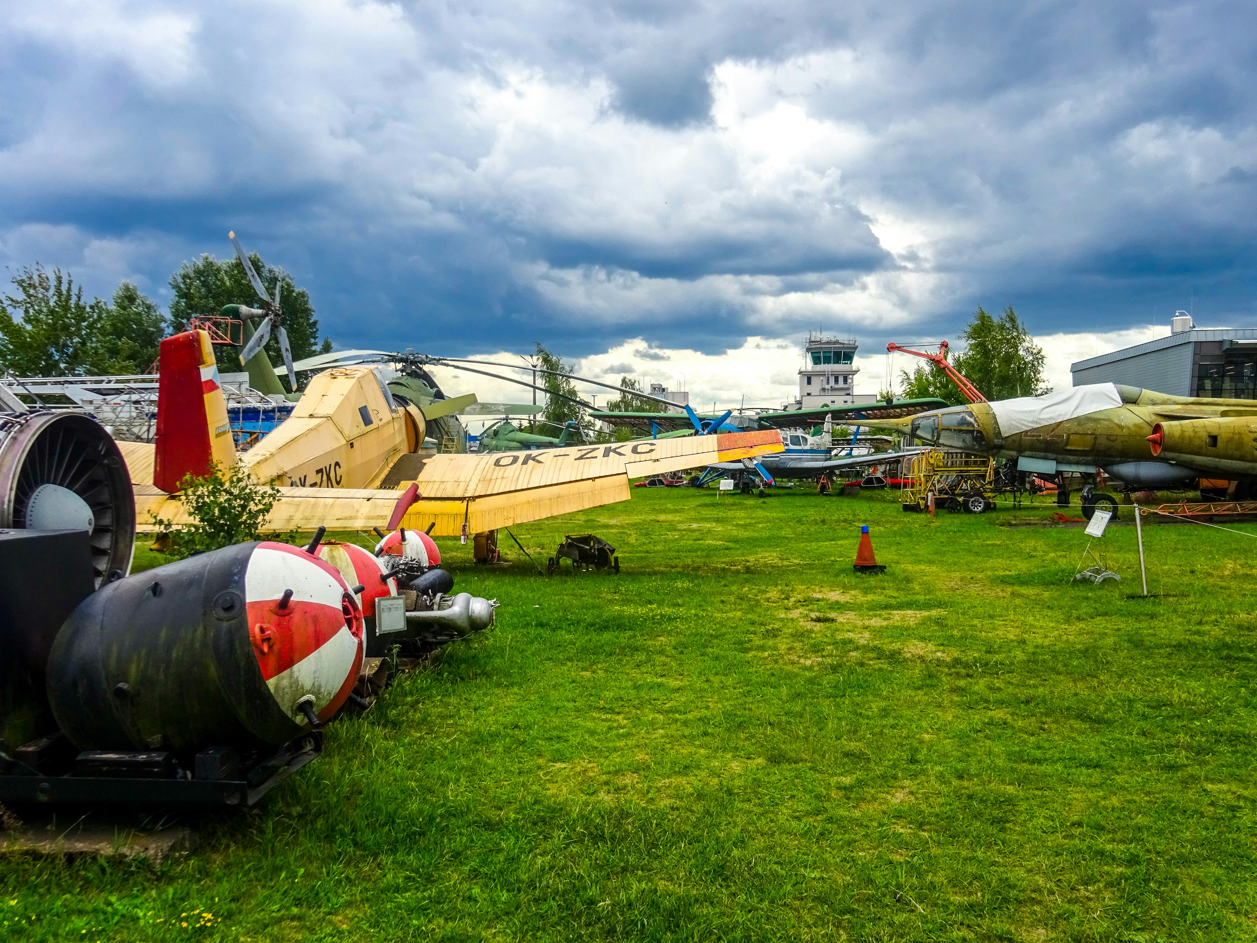 Abandoned Flight Line: Resting Wings Amid a Verdant Field