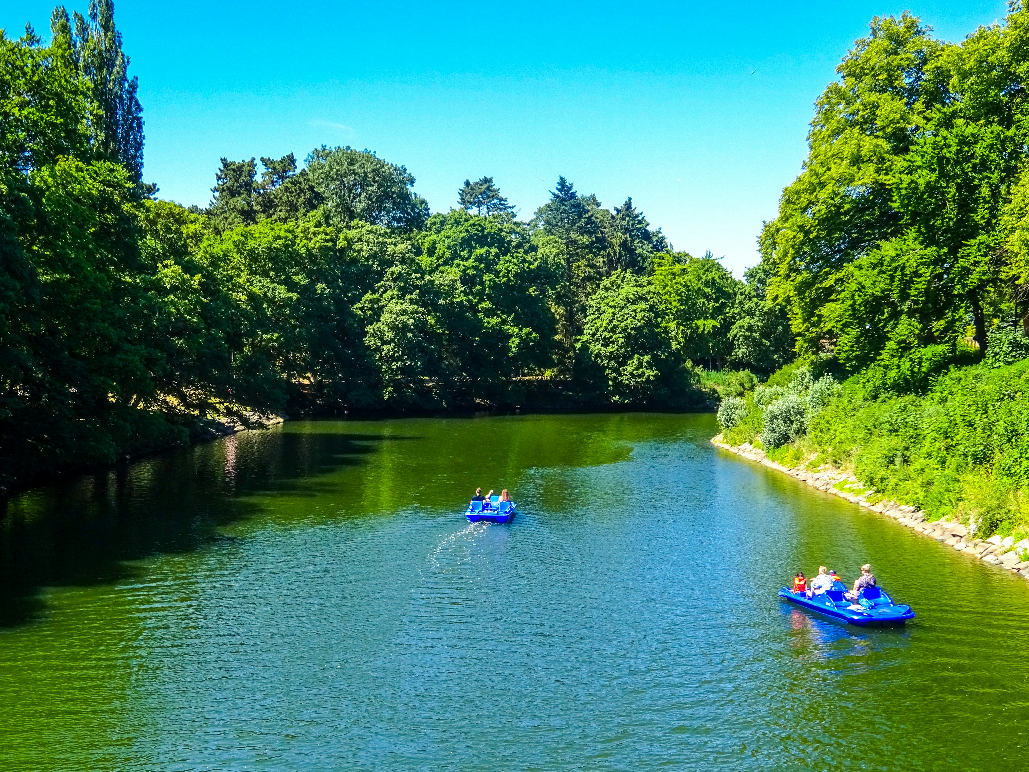 Blue Rafts on a Serene River Bend