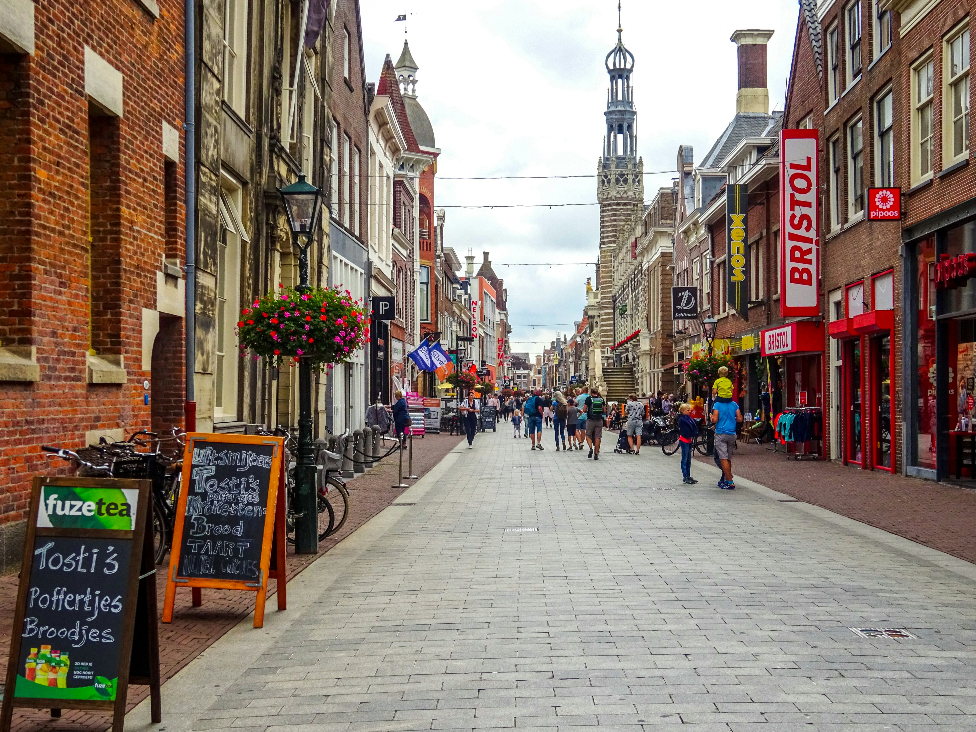 Pedestrian-friendly artery: a sunlit street scene framed by historic façades