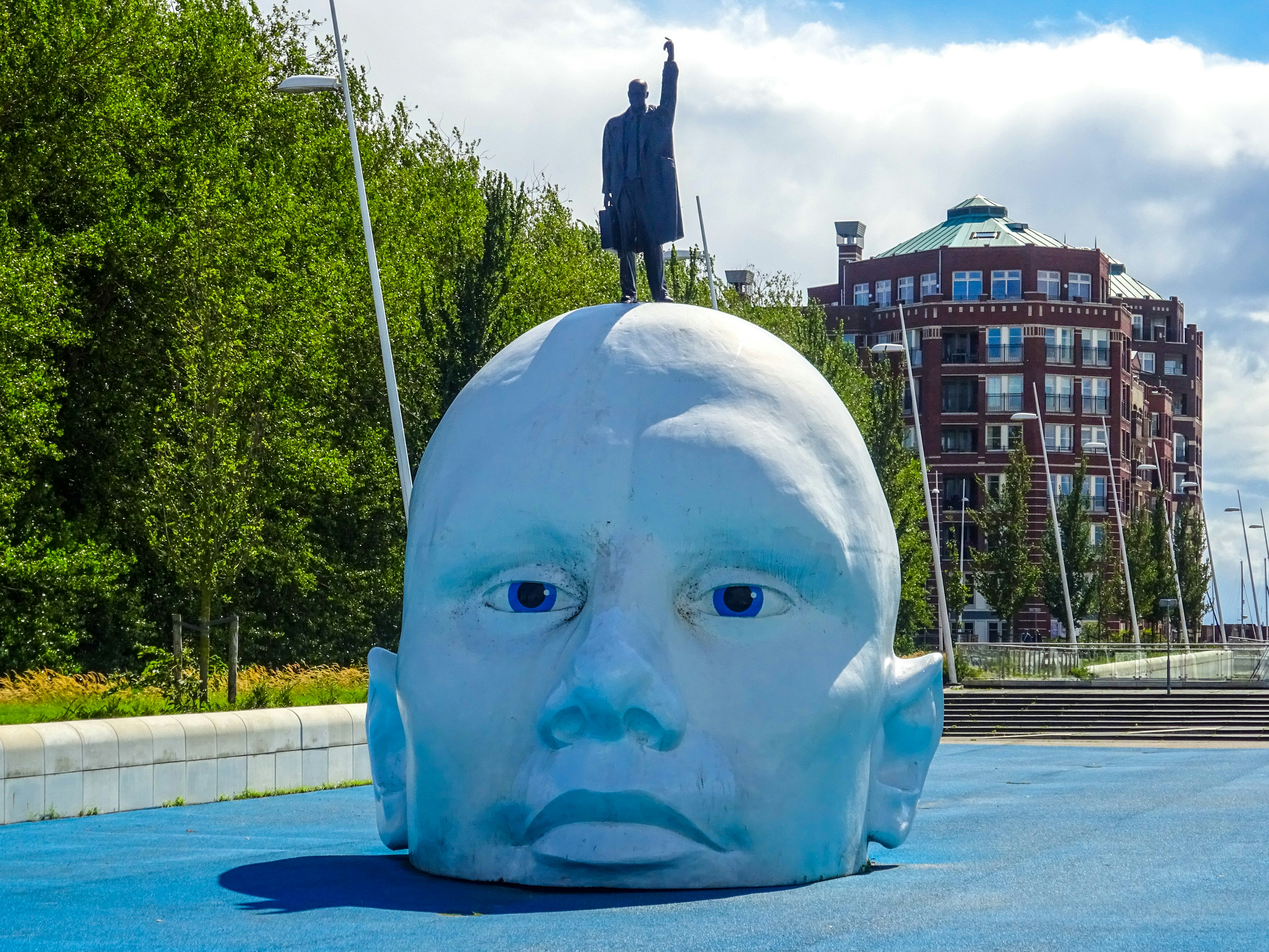 Head Above the City: A Giant Blue Portrait Rules the Plaza