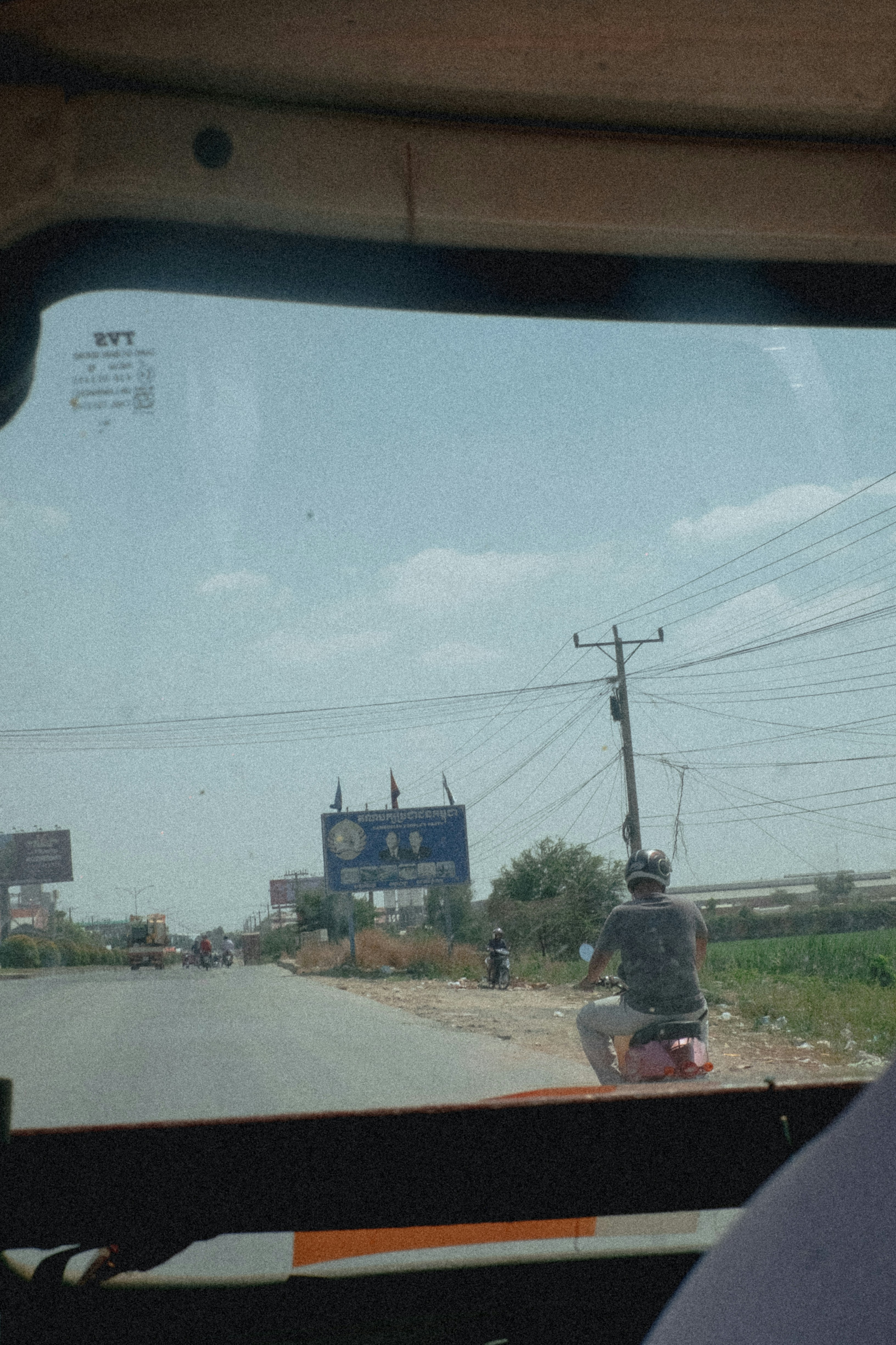 Rider in the Distance: Road into the Horizon