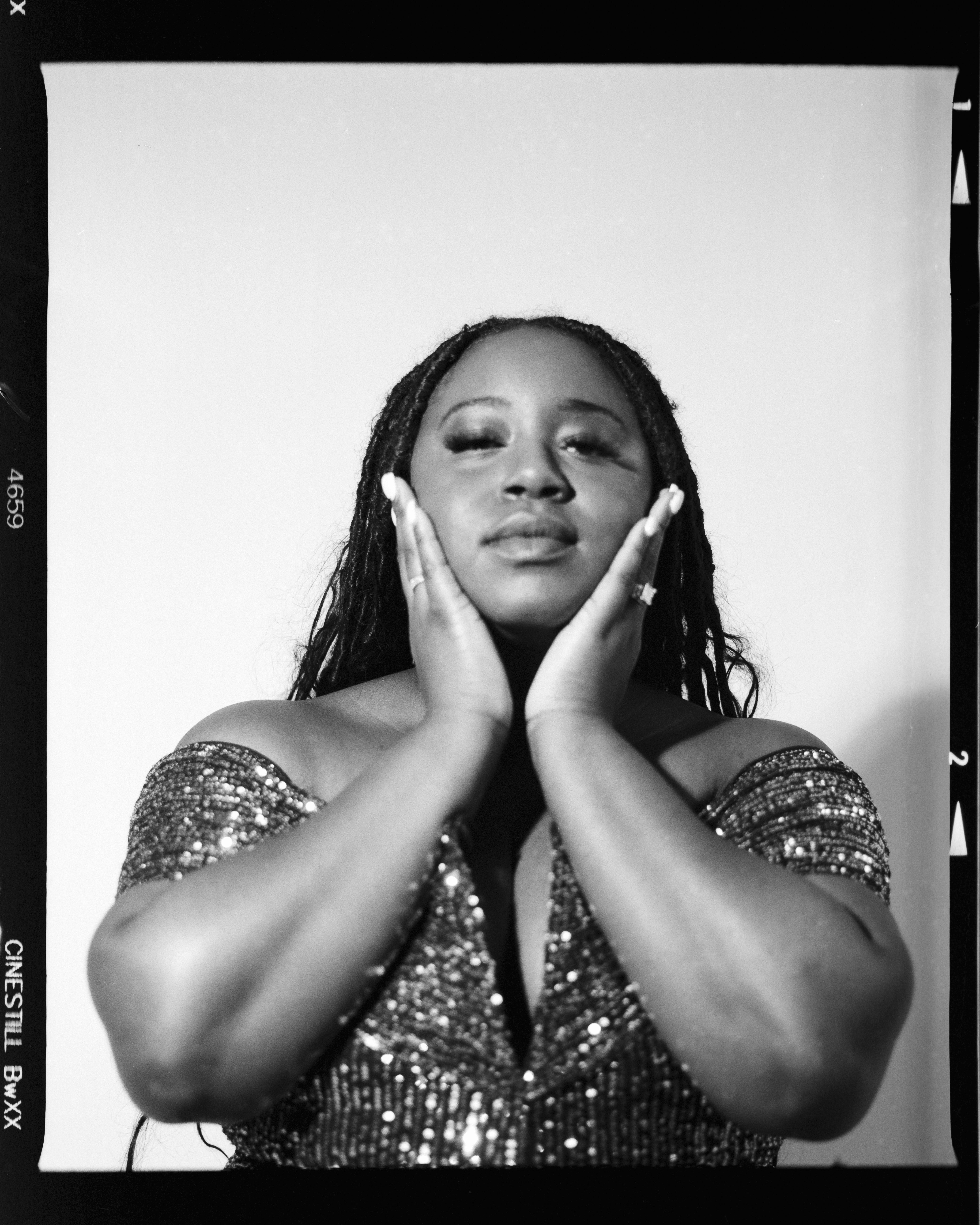 Hushed Glamour: Portrait ofConfidence in a Sequined Moment