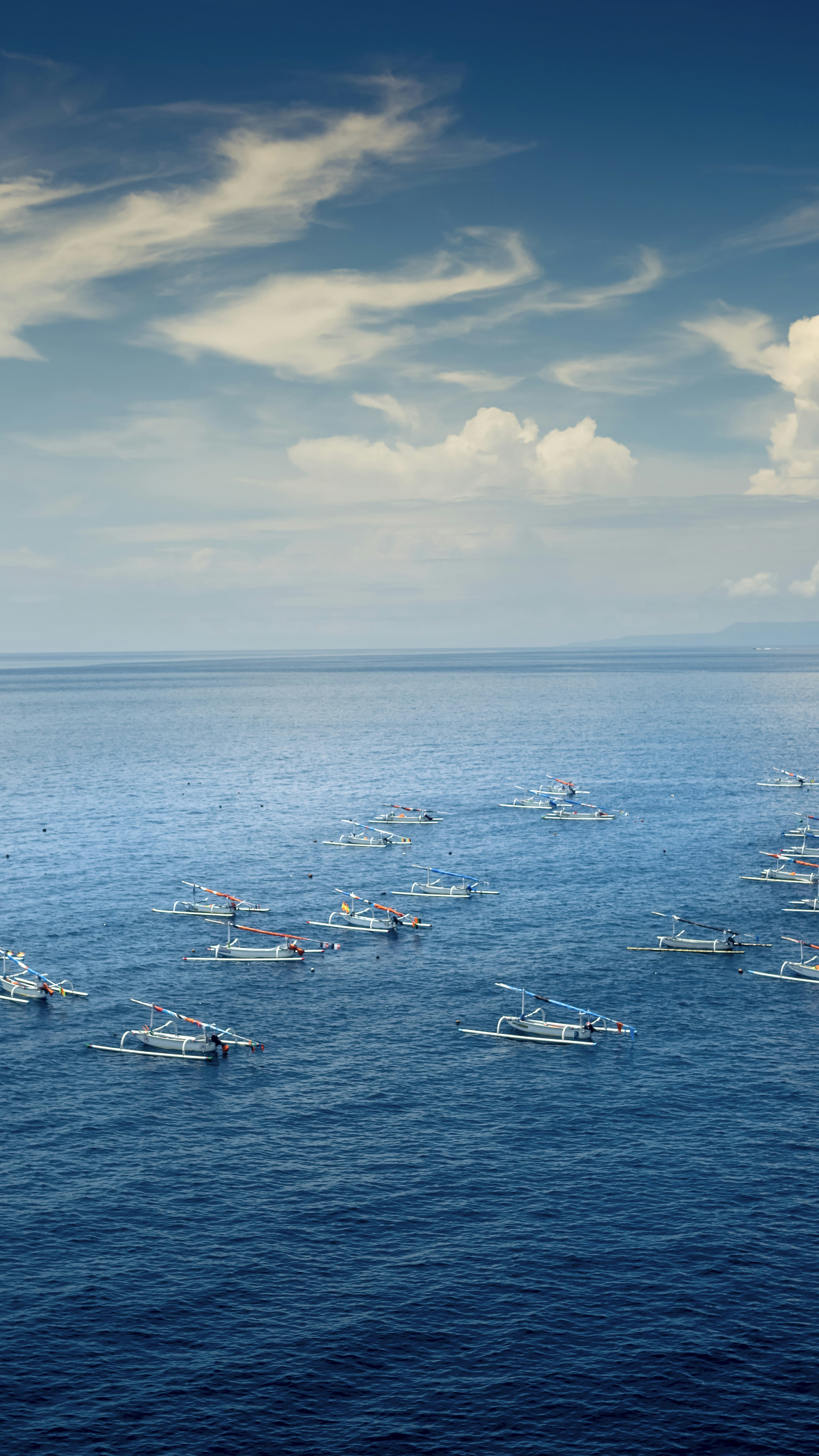 Fleet of Silent Dories on a Broad Pacific Line
