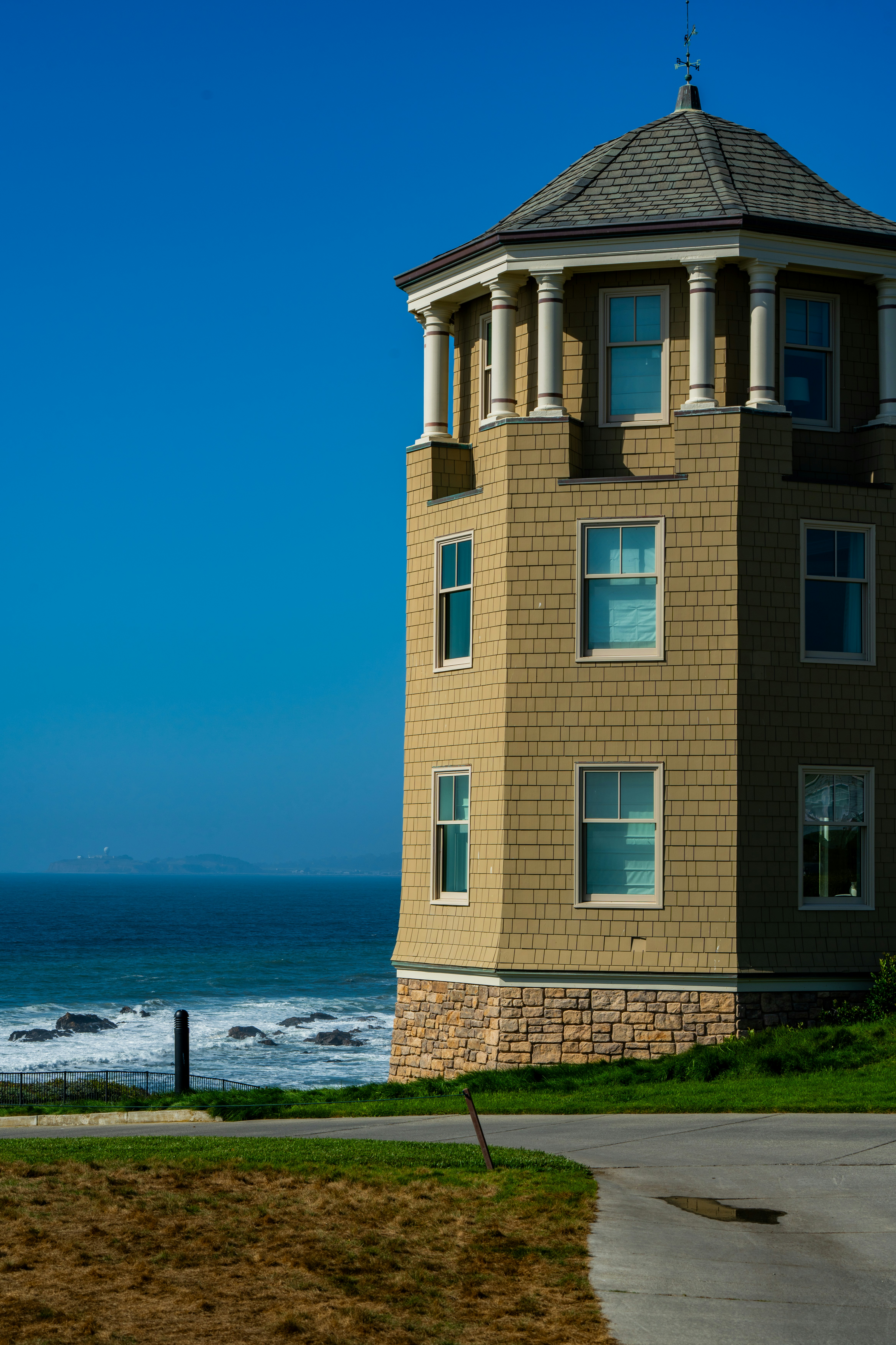 Coastal Turret: A Stone-and-Panel Beacon by the Sea
