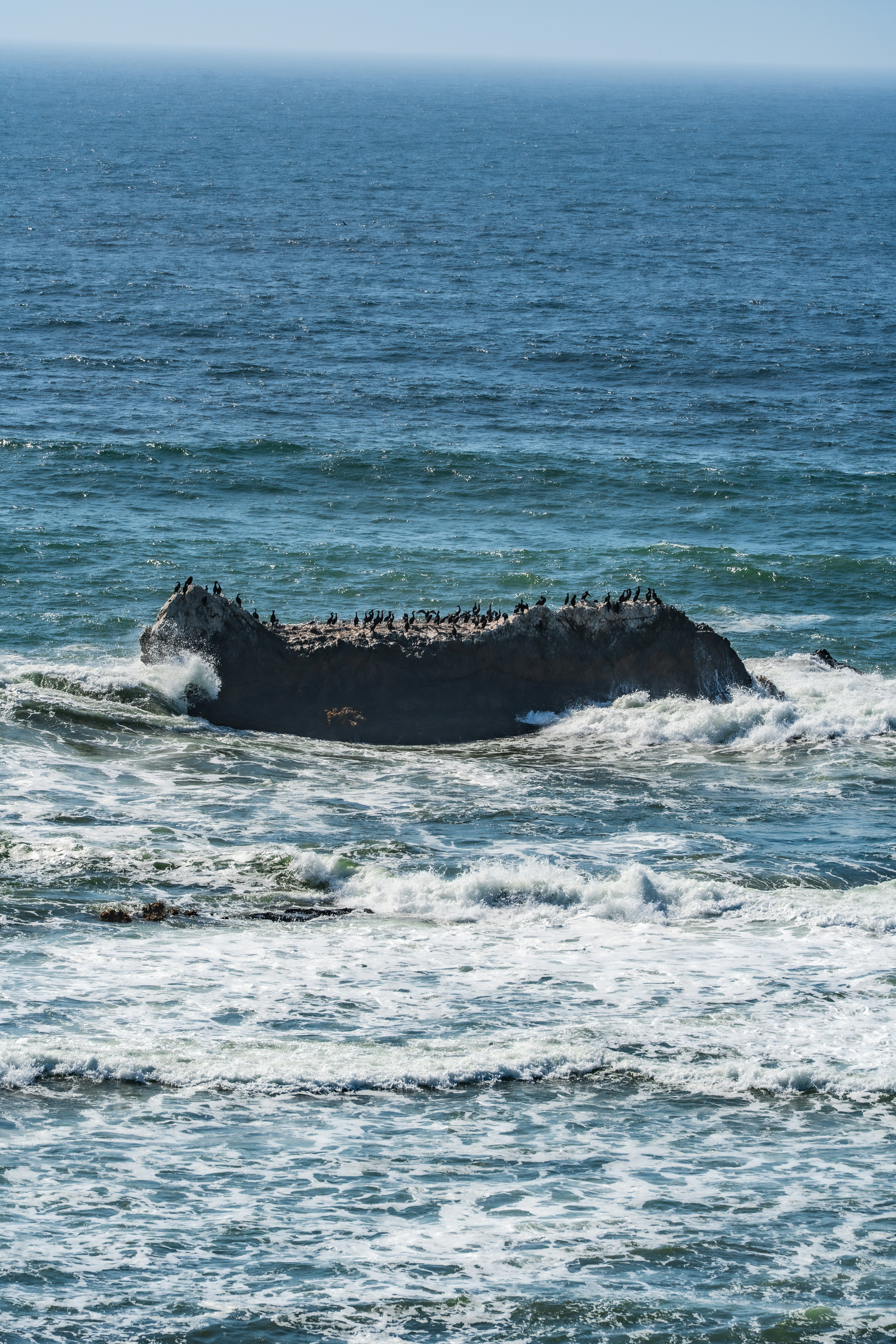 Sea Rock Outcrop Carved by Waves