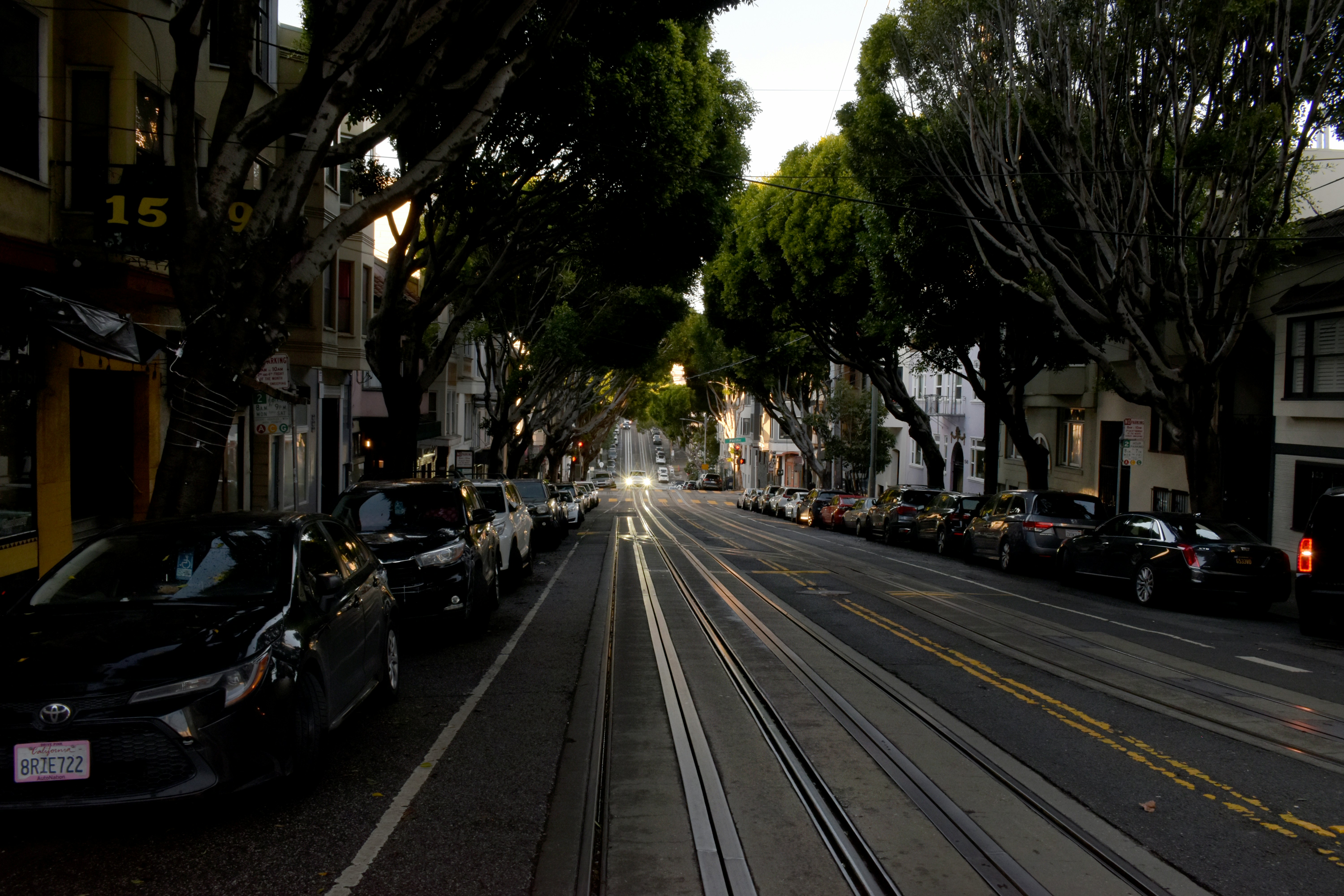 Transit Linings: Rails Run Through an Urban Canyon at Dusk
