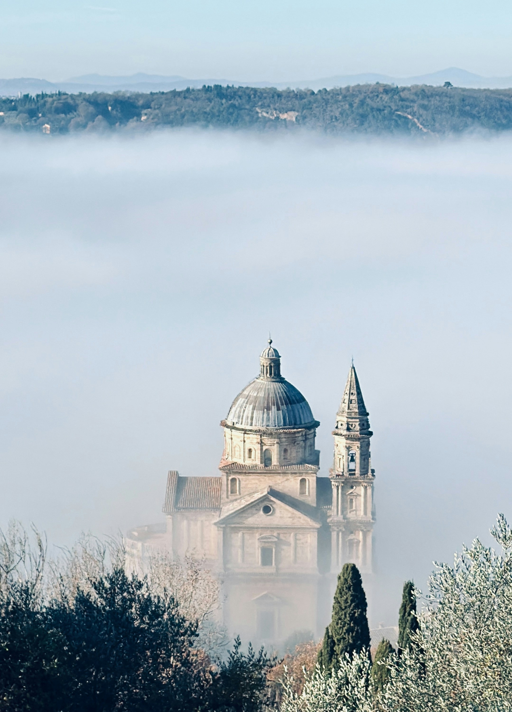 Mist-Clad Dome: A Cathedral Emerging from the Fog