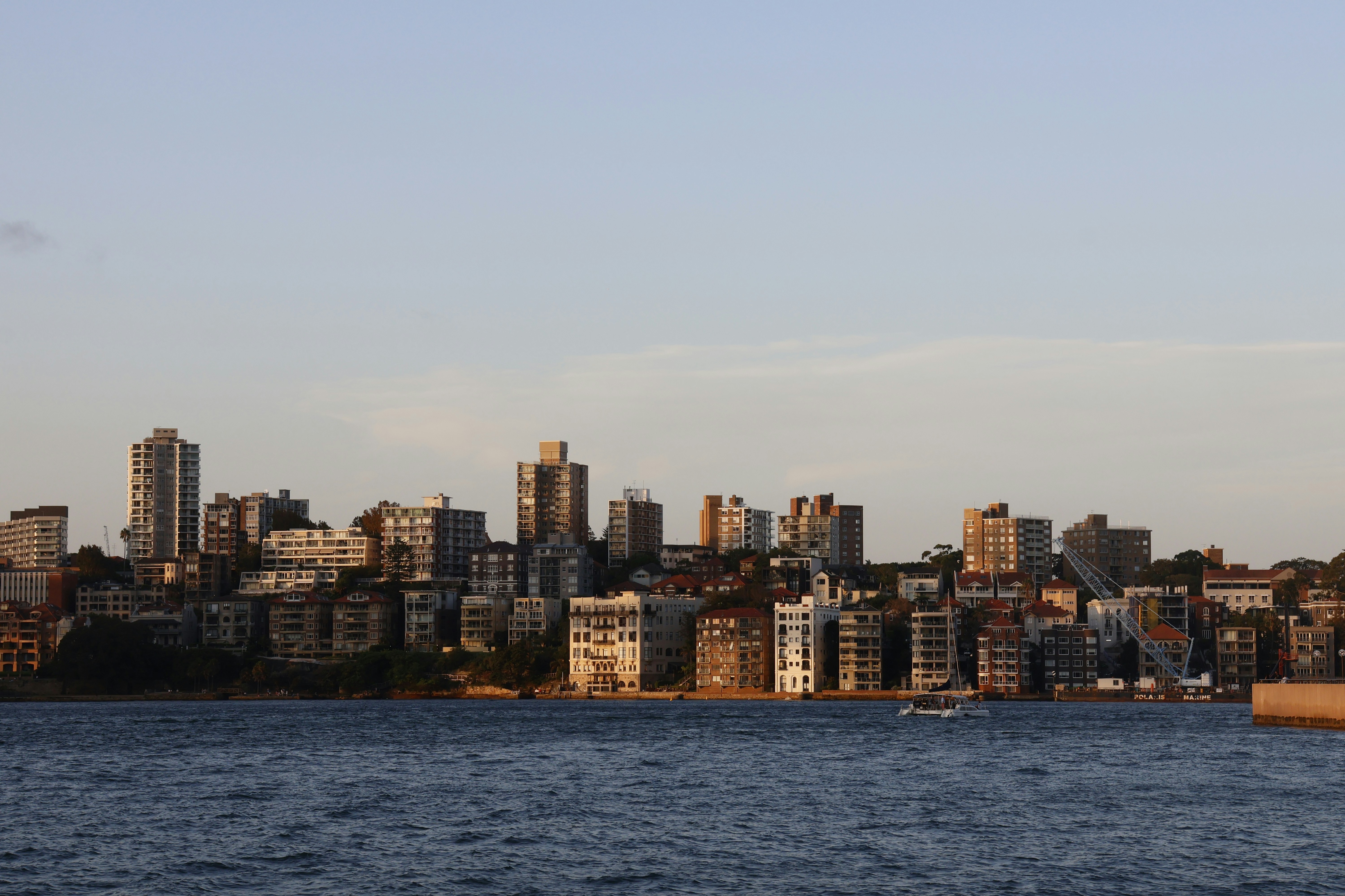 Harborline Dusk: Urban Rhythm Along the Waterfront
