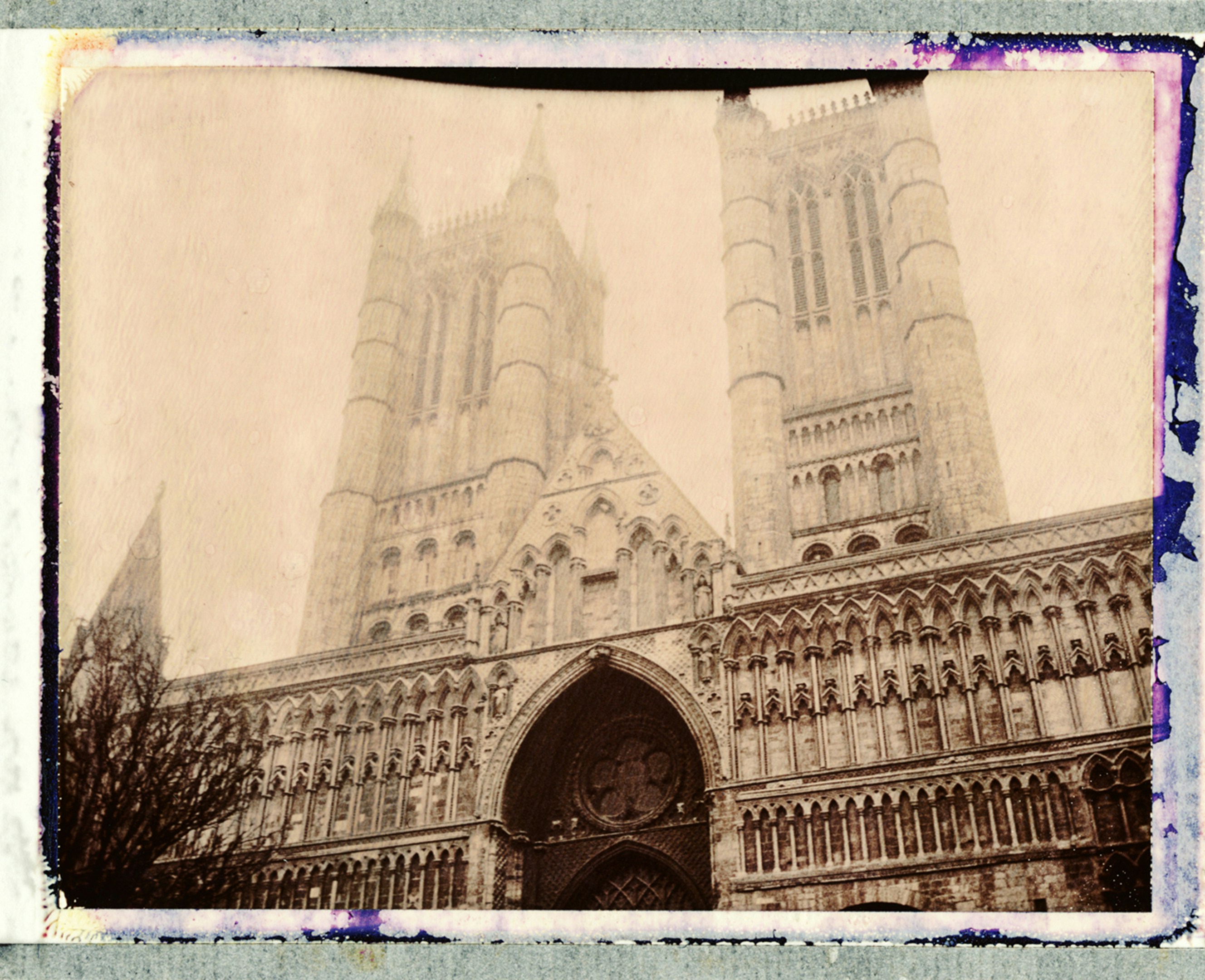 Gothic cathedral towers against a cloudy sky photo – Free Architecture ...