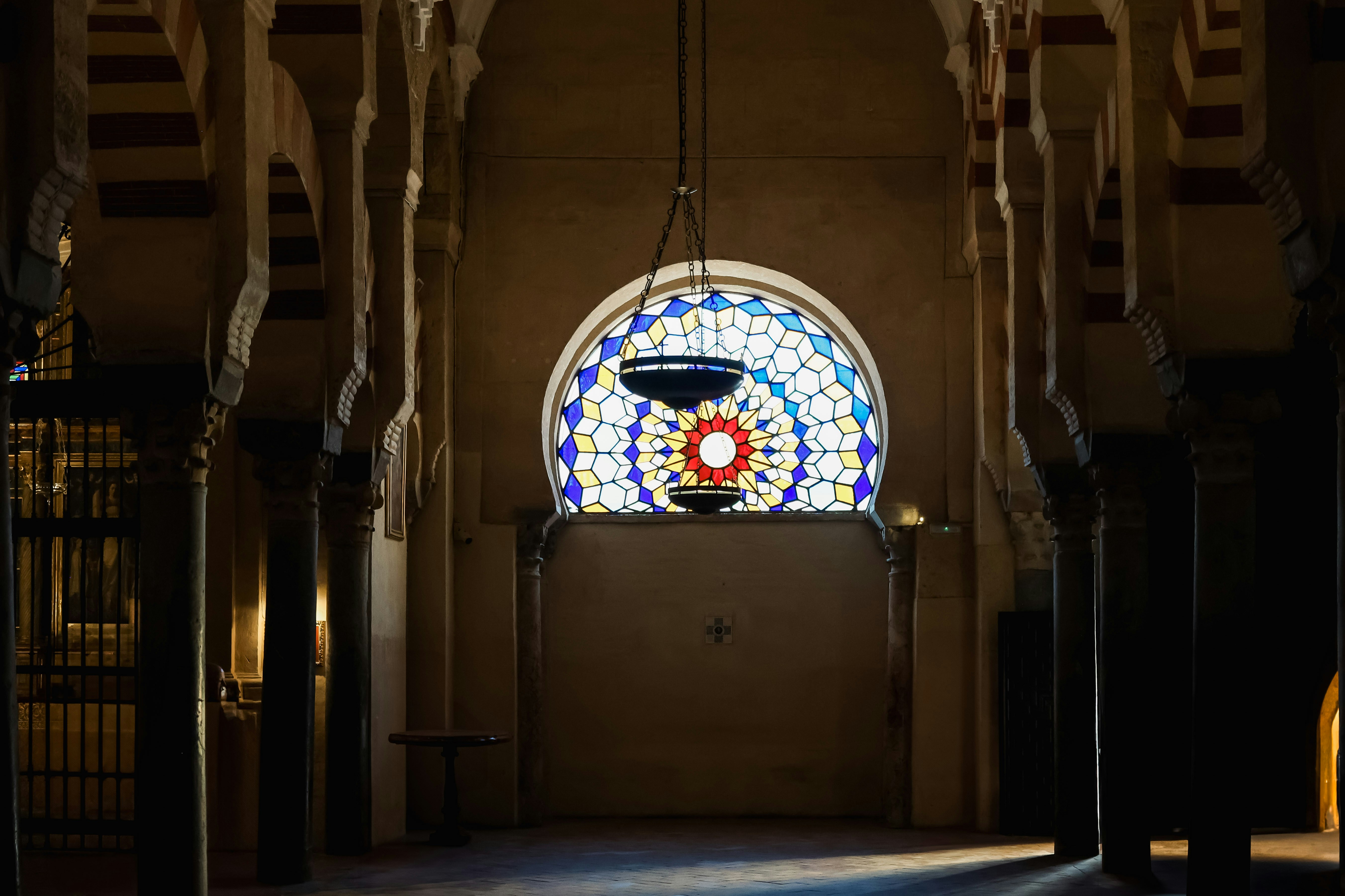 Stained Glass Halo Over a Quiet Hallway
