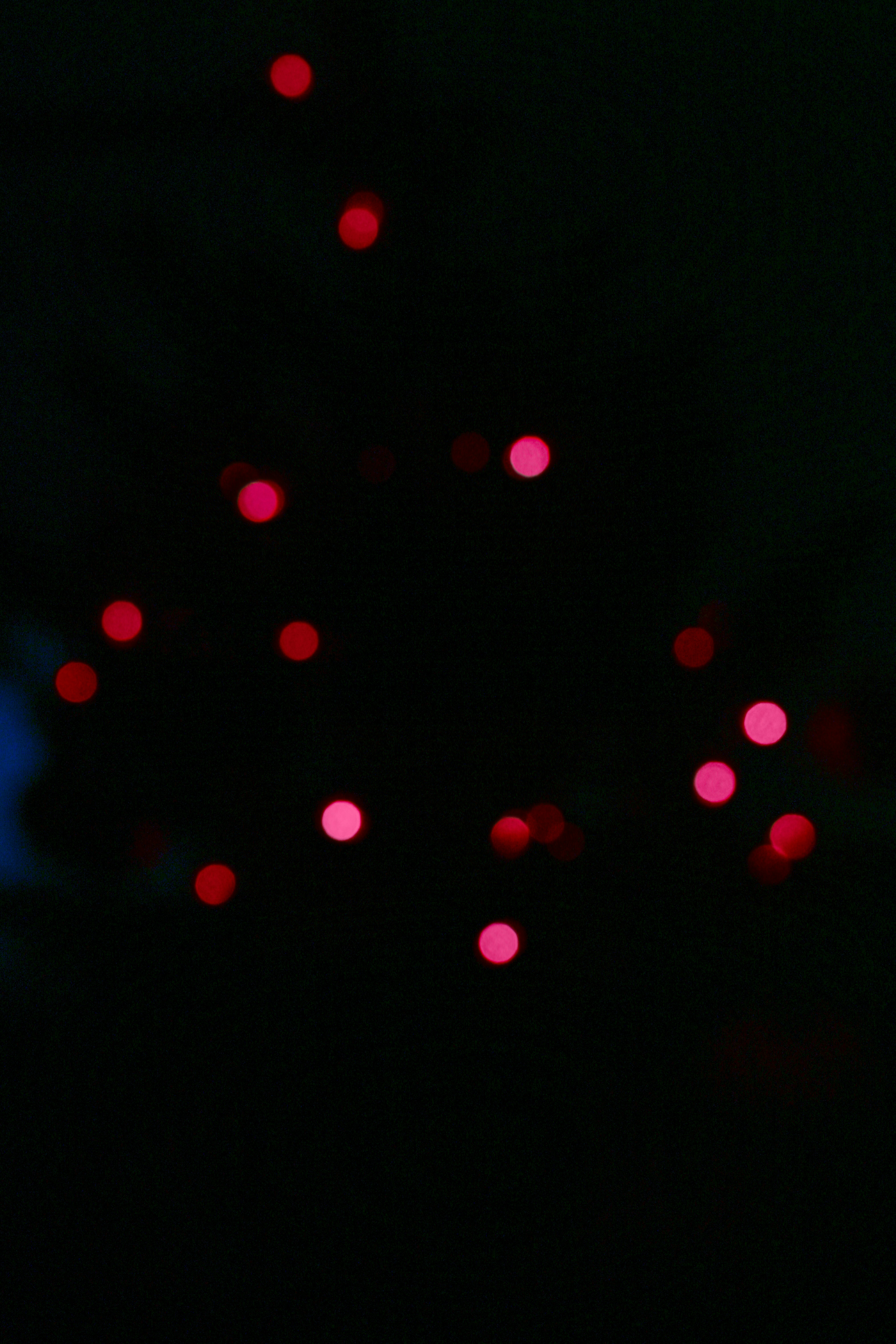 Blurred red lights on a dark background