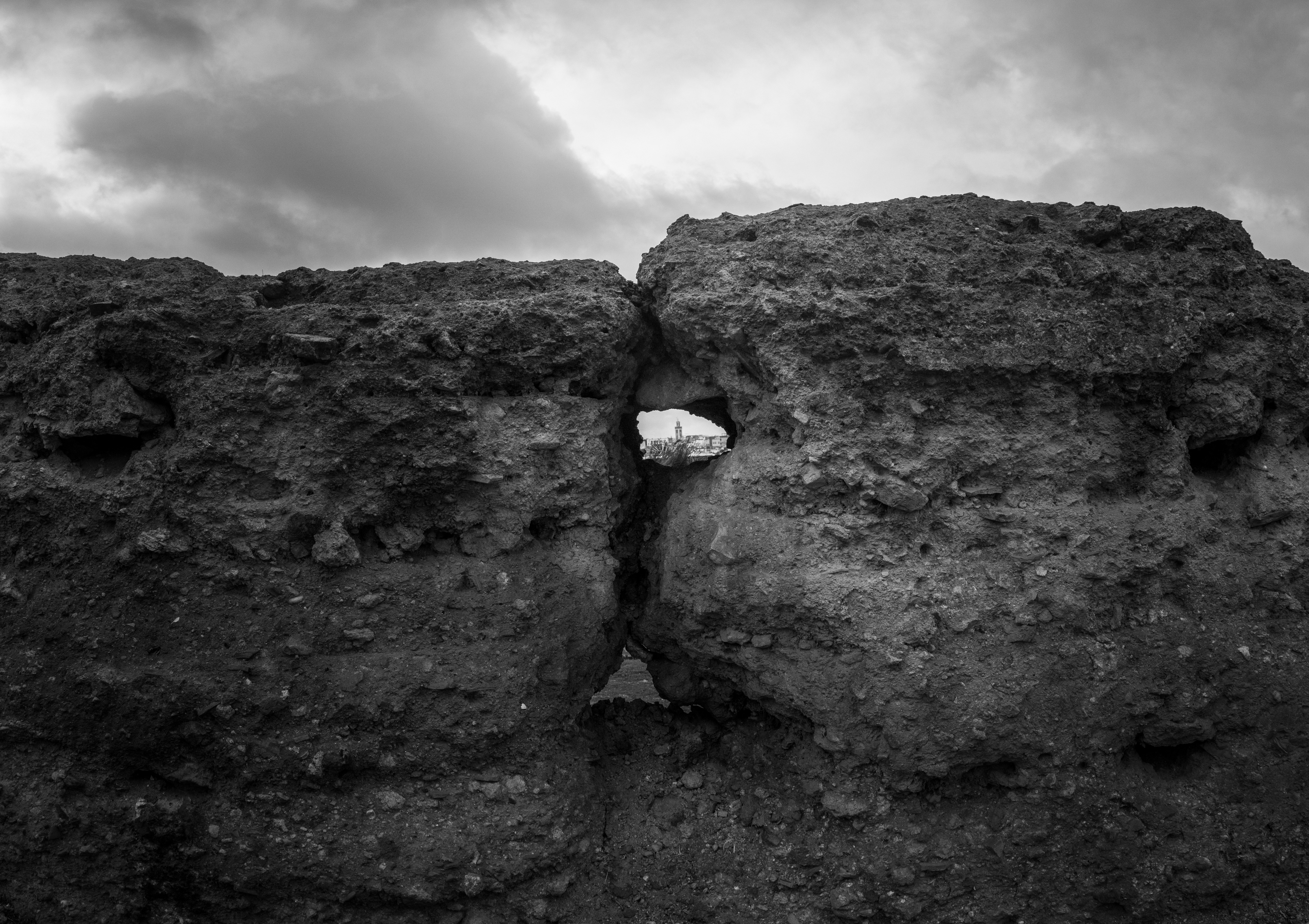 A Narrow Aperture Between Ancient Rocks
