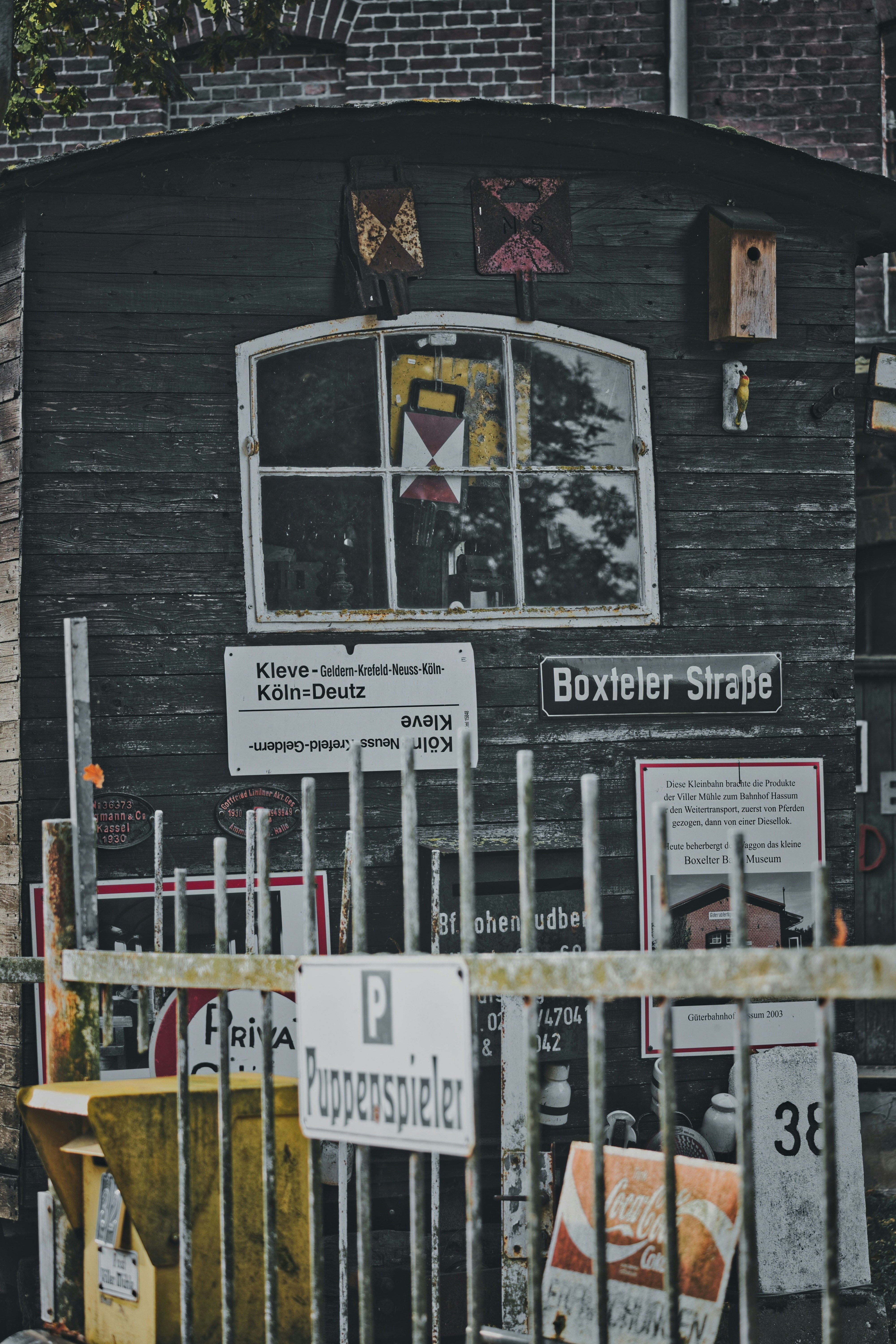 Weathered storefront in a cluttered urban alley