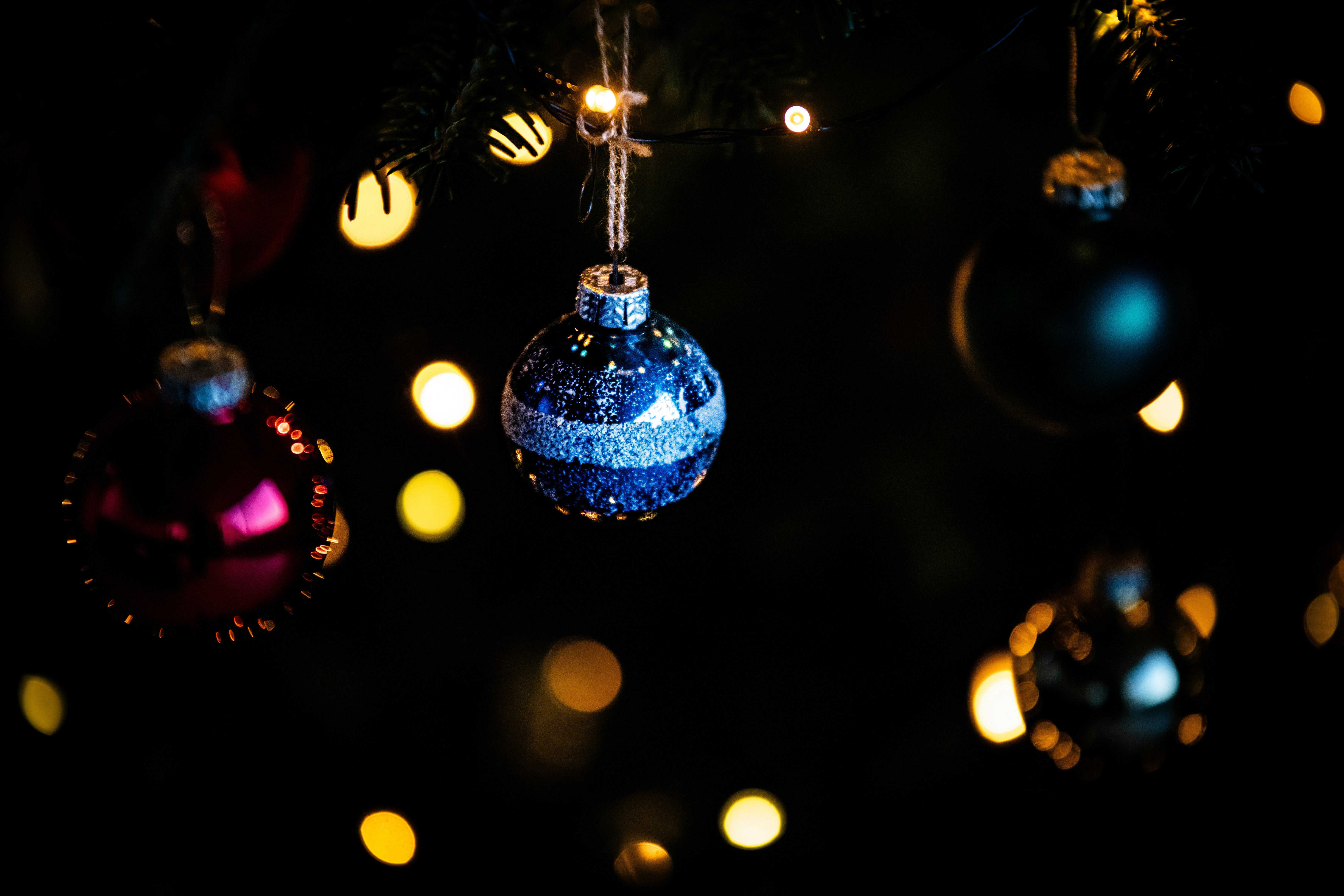Blue Glitter Ornament in a Quiet Christmas Glow
