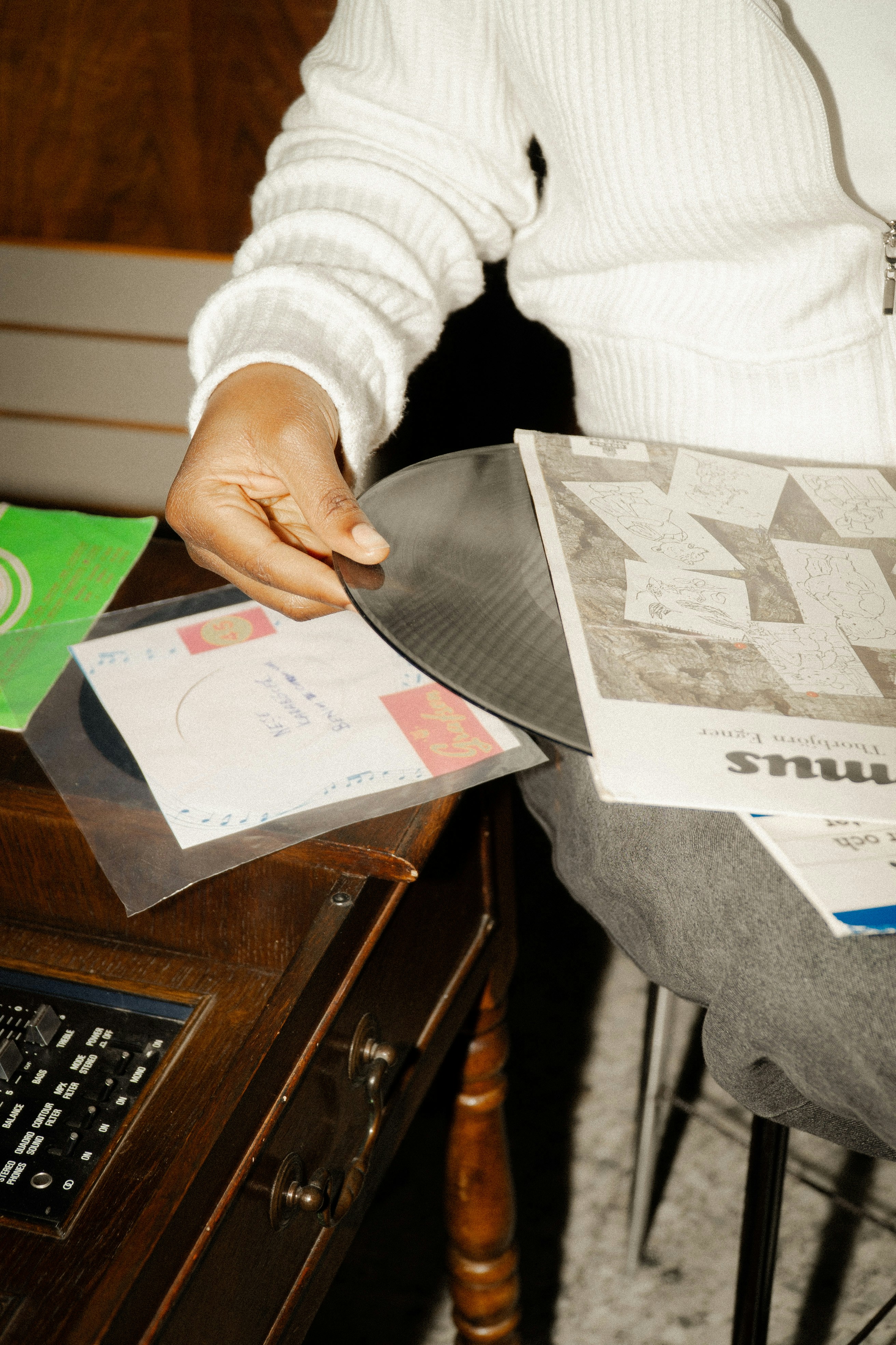 Hands on vinyl: rediscovering a paper record by the desk lamp