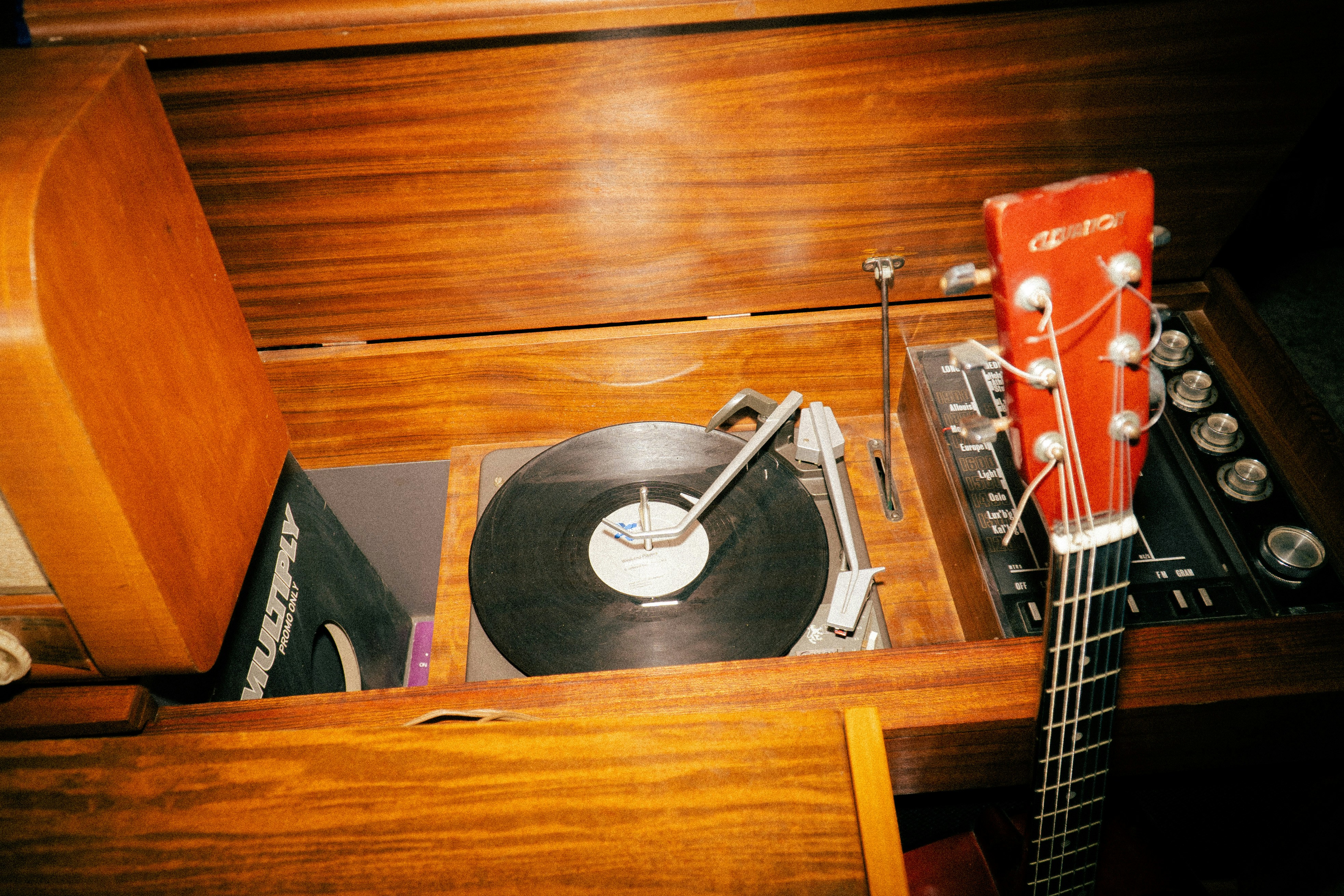 Turntable Within a Wooden Console: A Quiet Corner of Vintage Sound