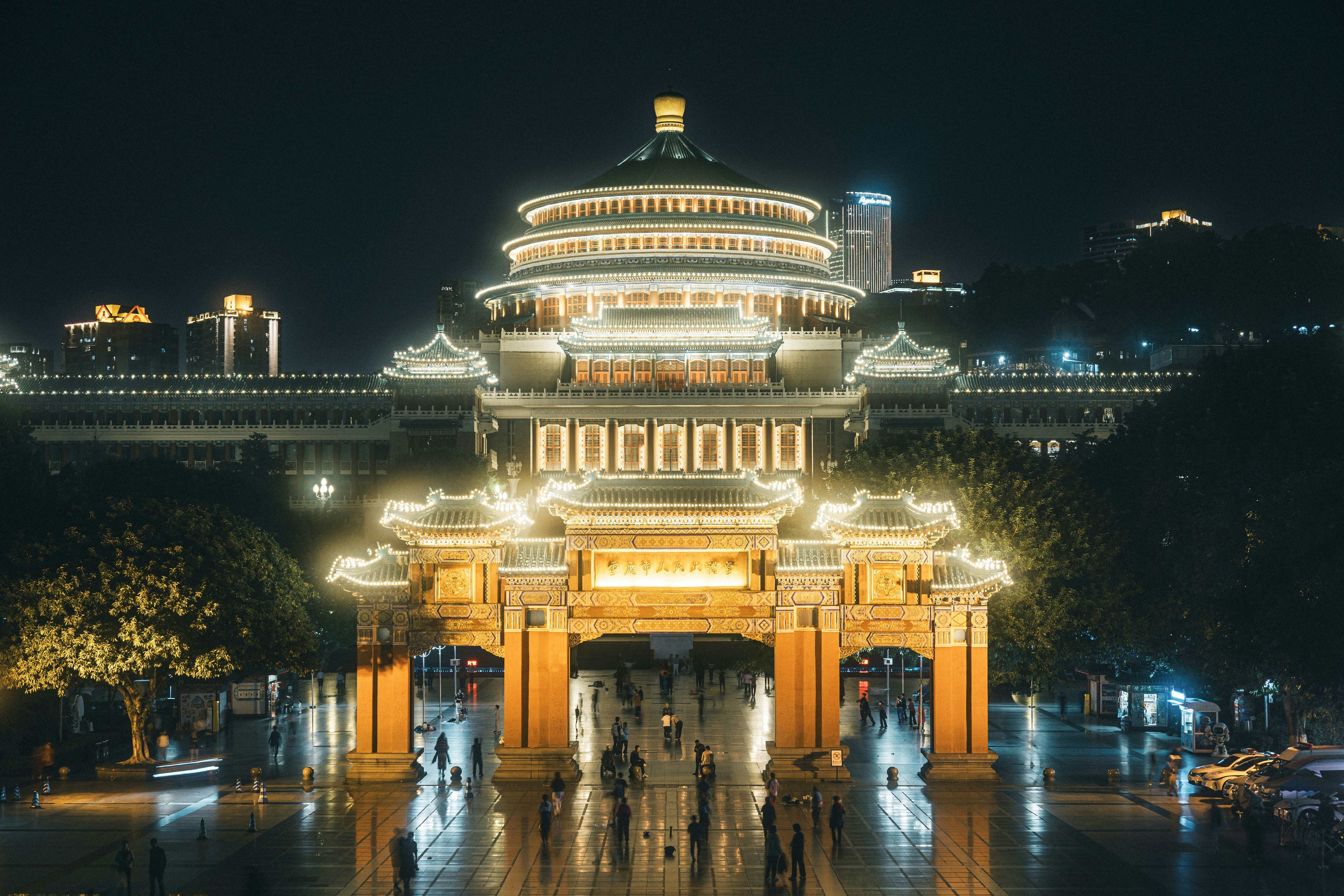 Illuminated Gatehouse: Nighttime Glow Over a Chinese Pavilion