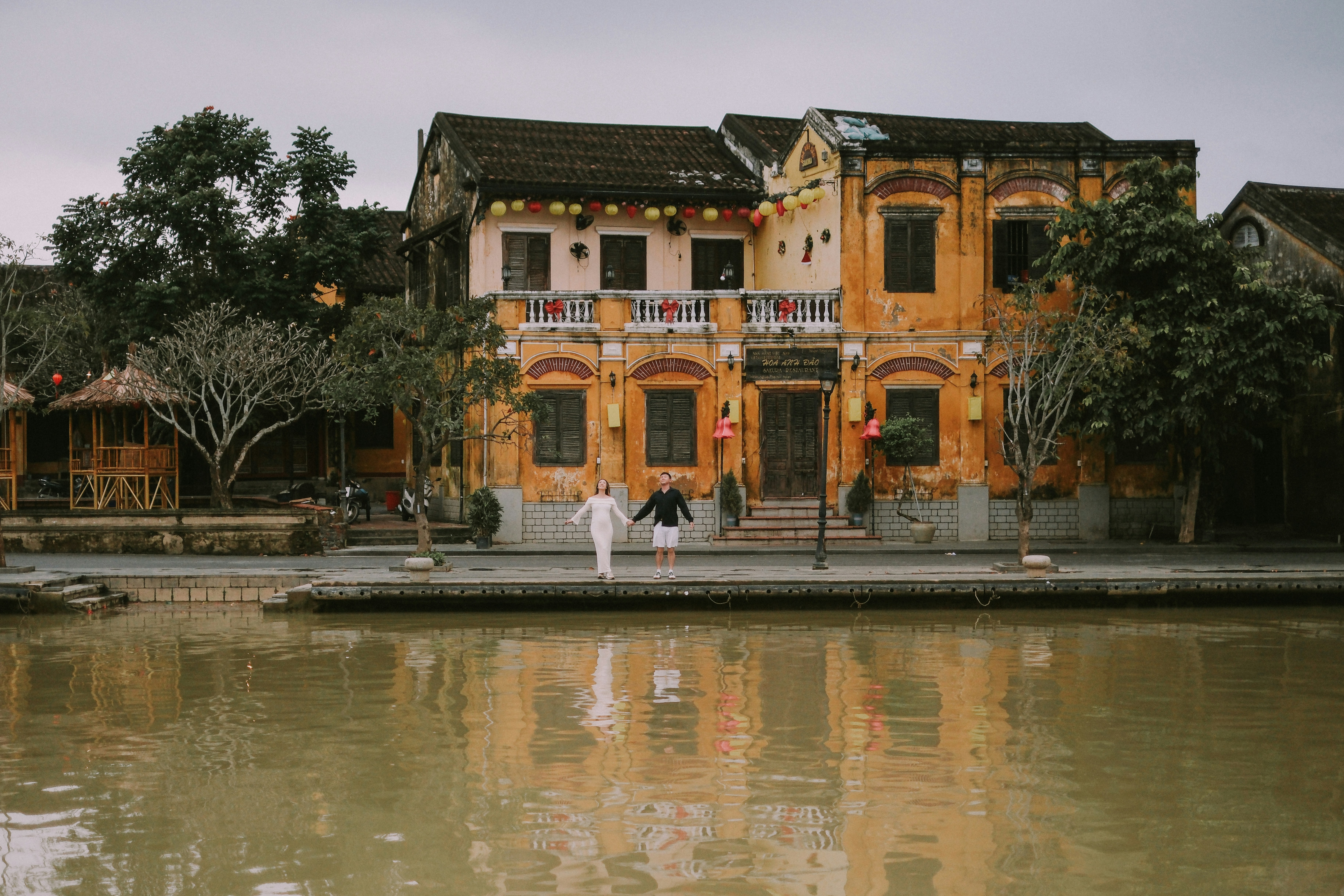 Warm-Orange Facade by the Riverbank