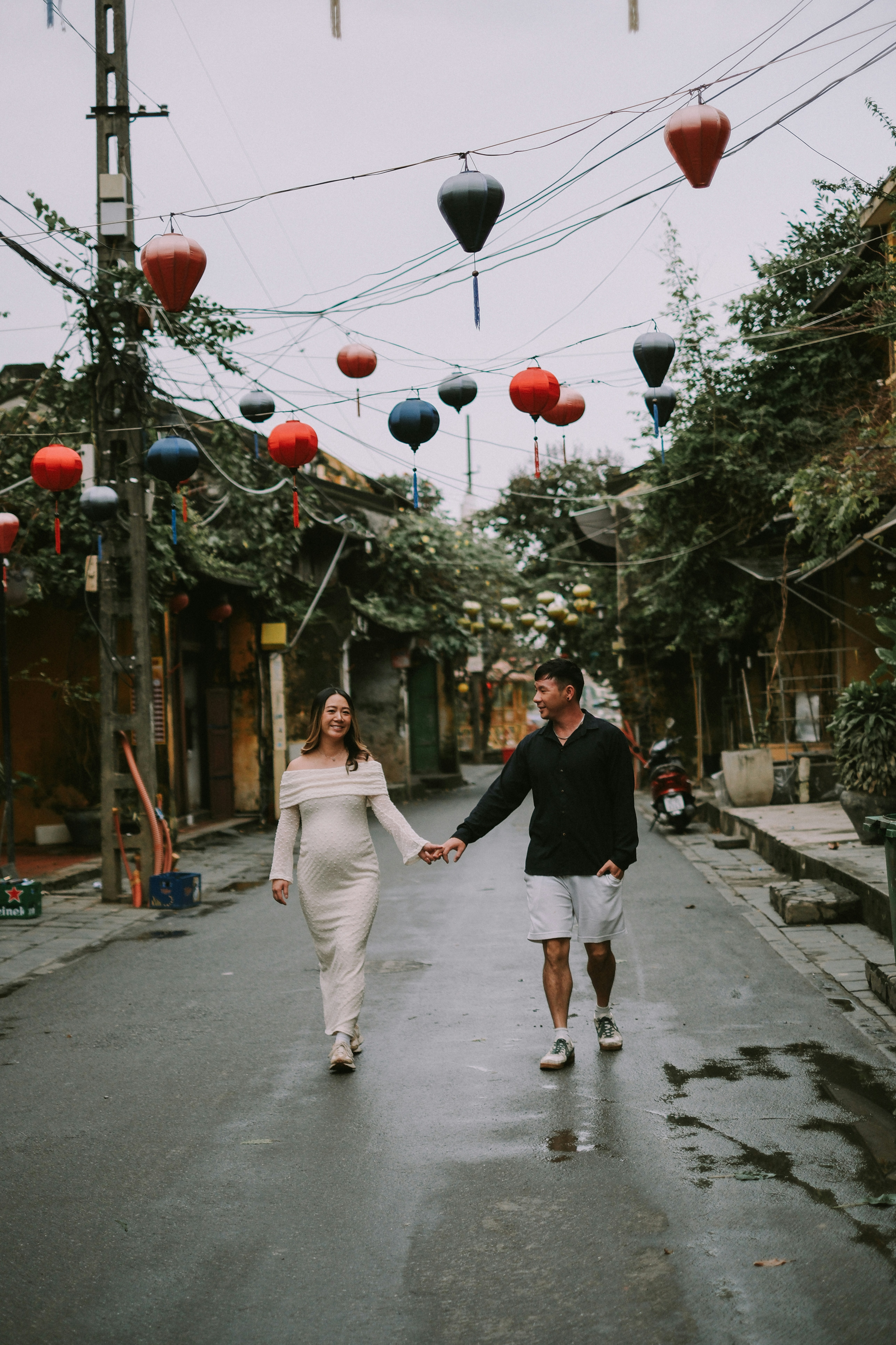 Holding Hands Beneath Lanterns: A Quiet Walk Through a Lantern-Decorated Street