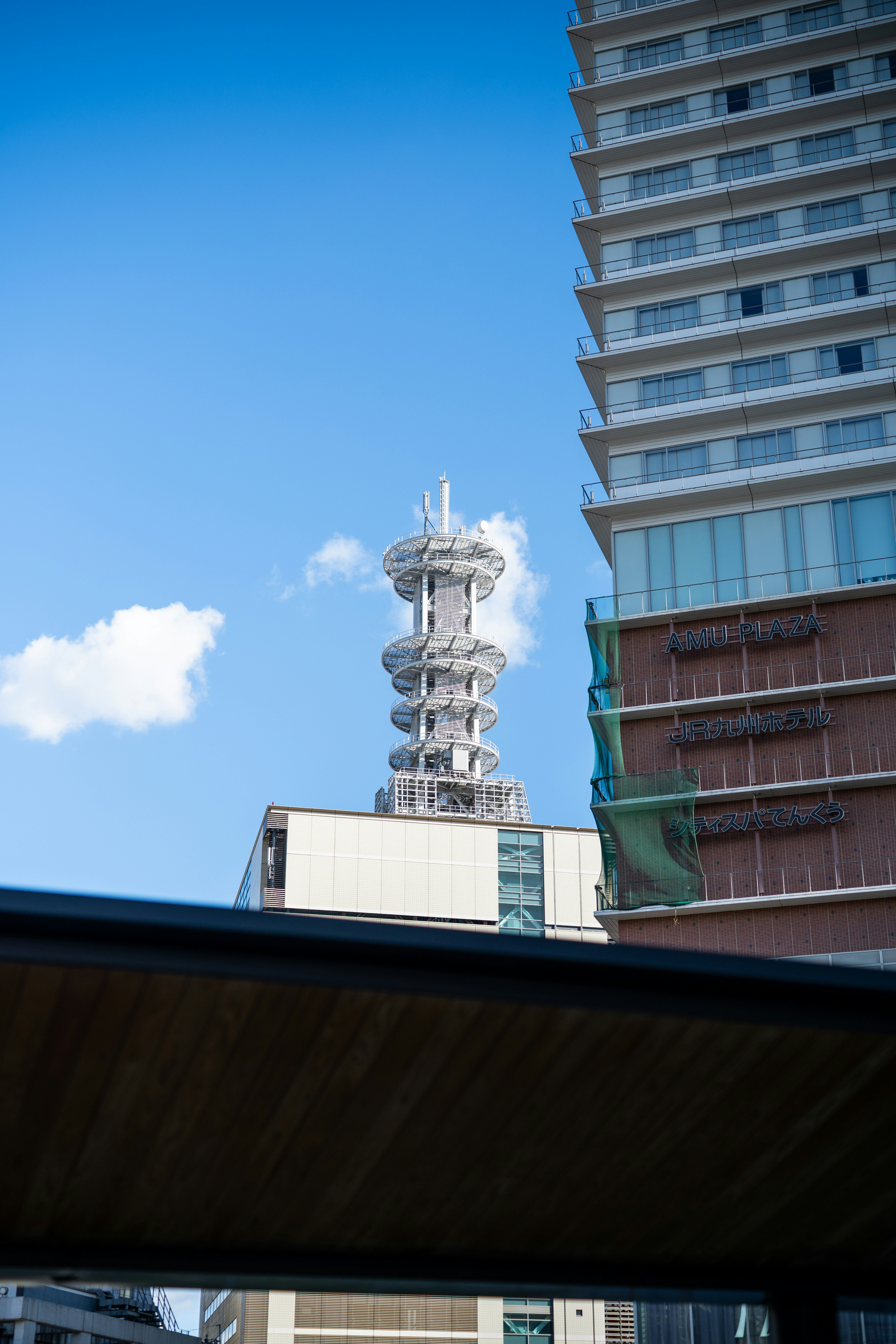 Skyline Beacon: A Towered Spire Against a Clear Blue Lux