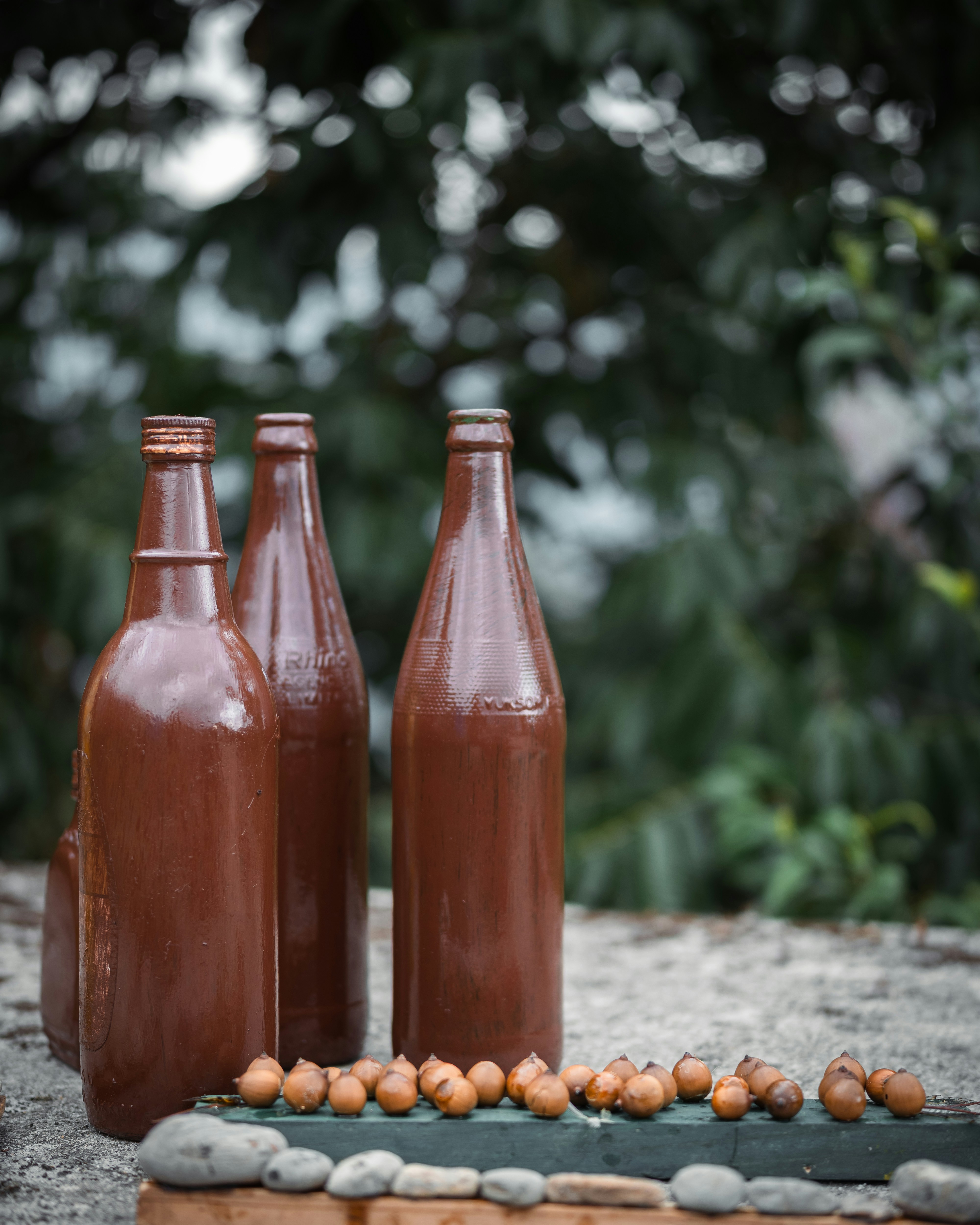Rusty Brown Bottles on a Weathered Slab