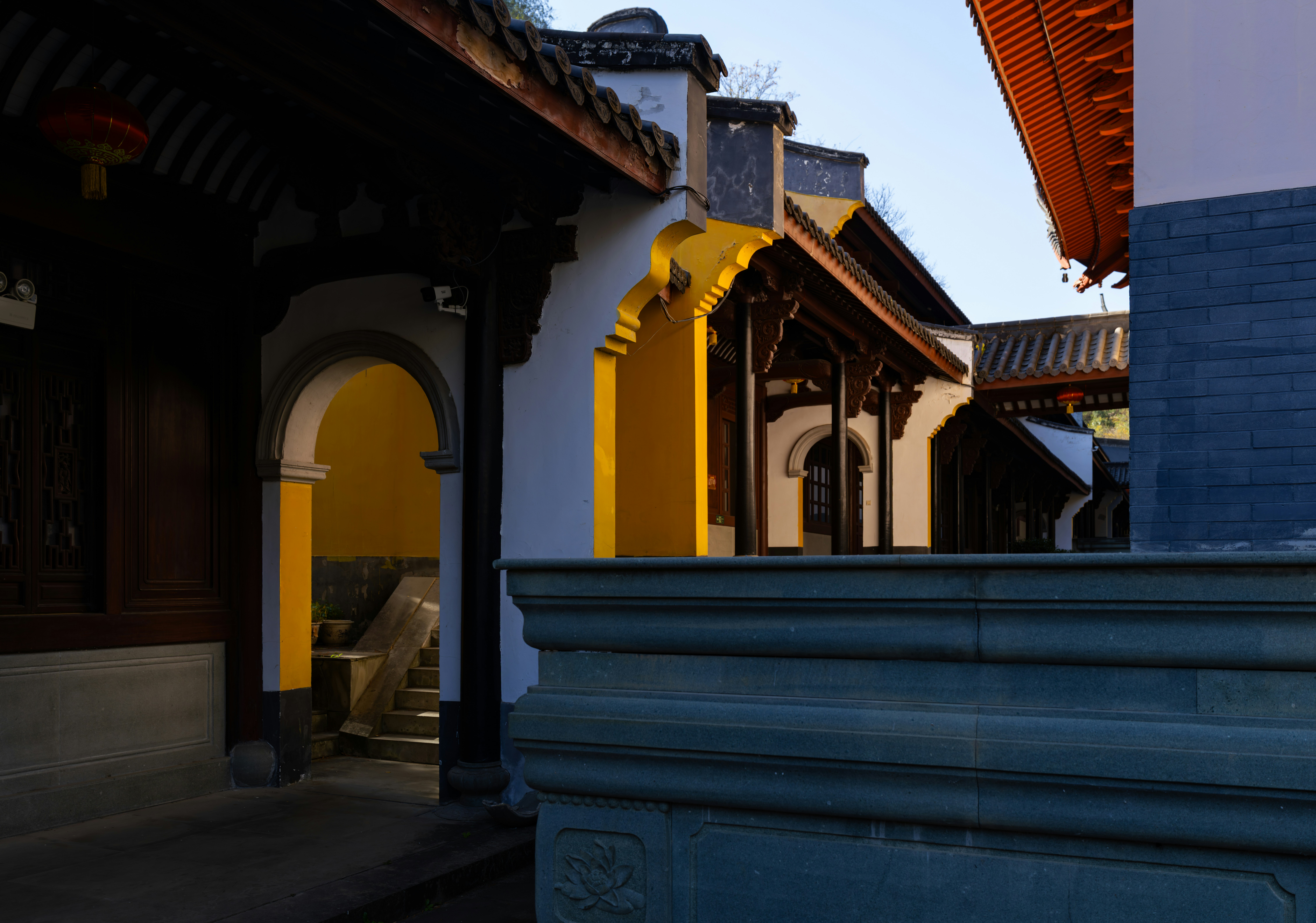 Sunlit Portal Through the Cloister: Geometry and Shadow