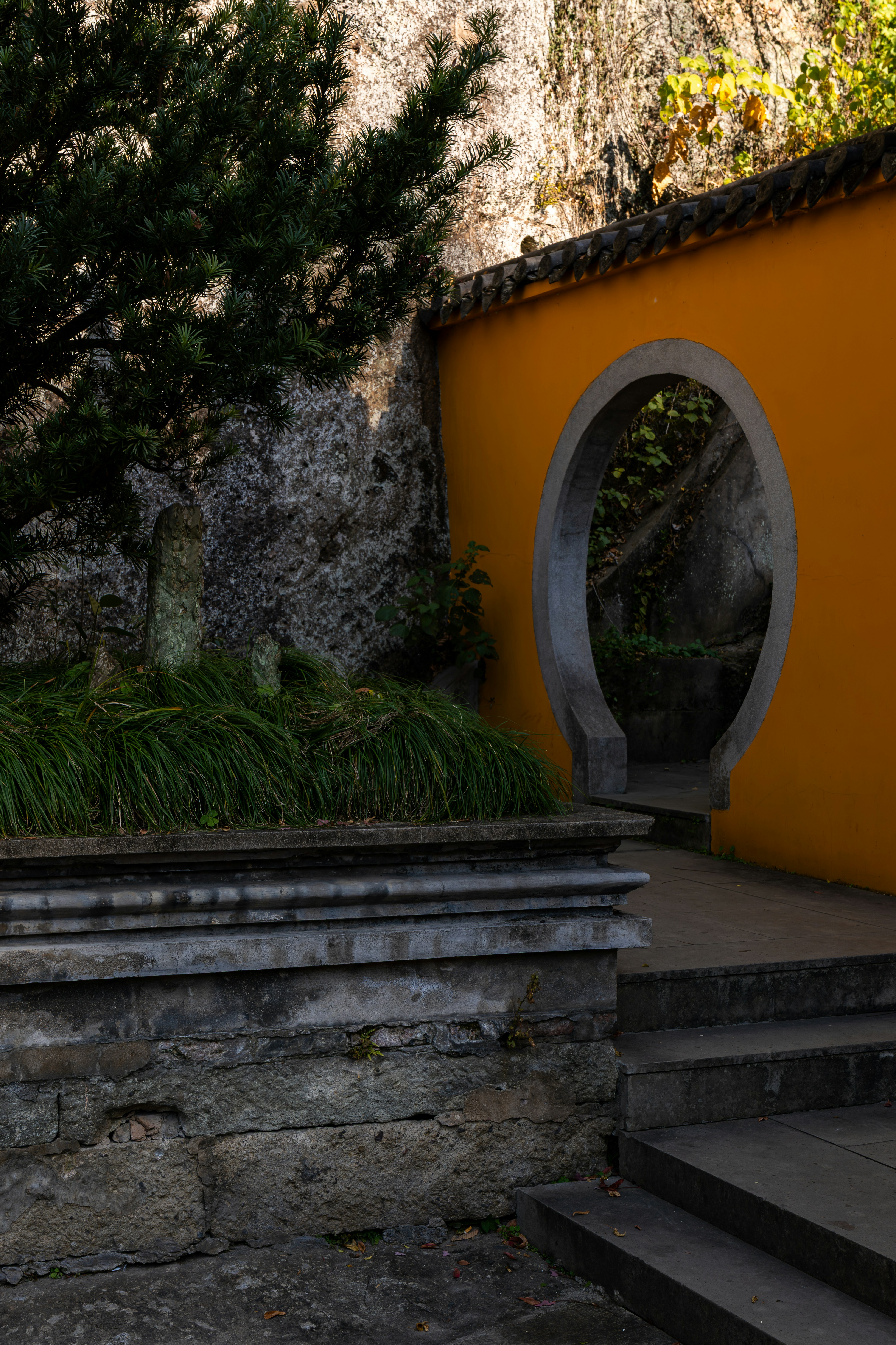 Orange Archway in Quiet Courtyard