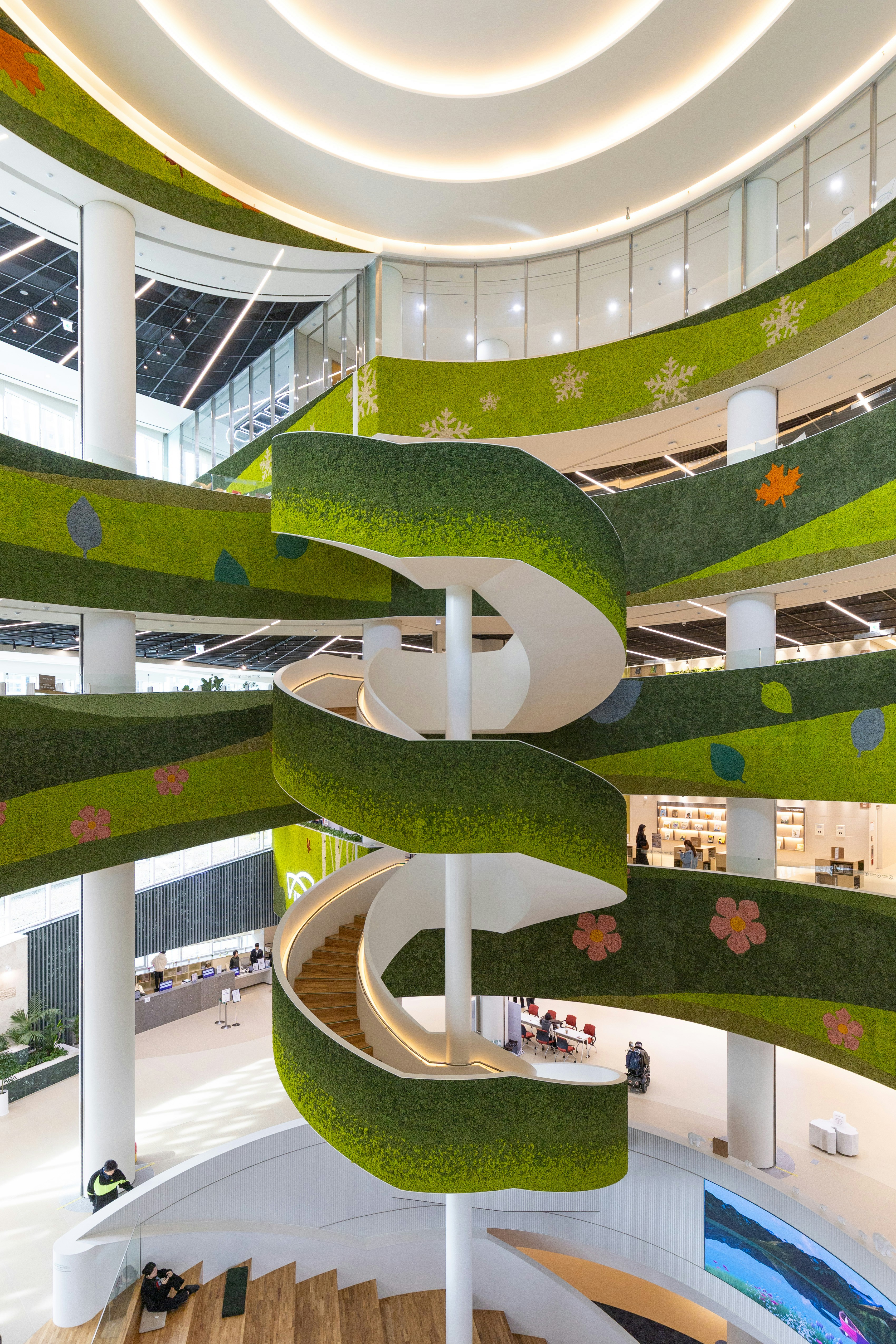 Spiraling Green: A Vertical Garden Atrium’s Bold Ribbon