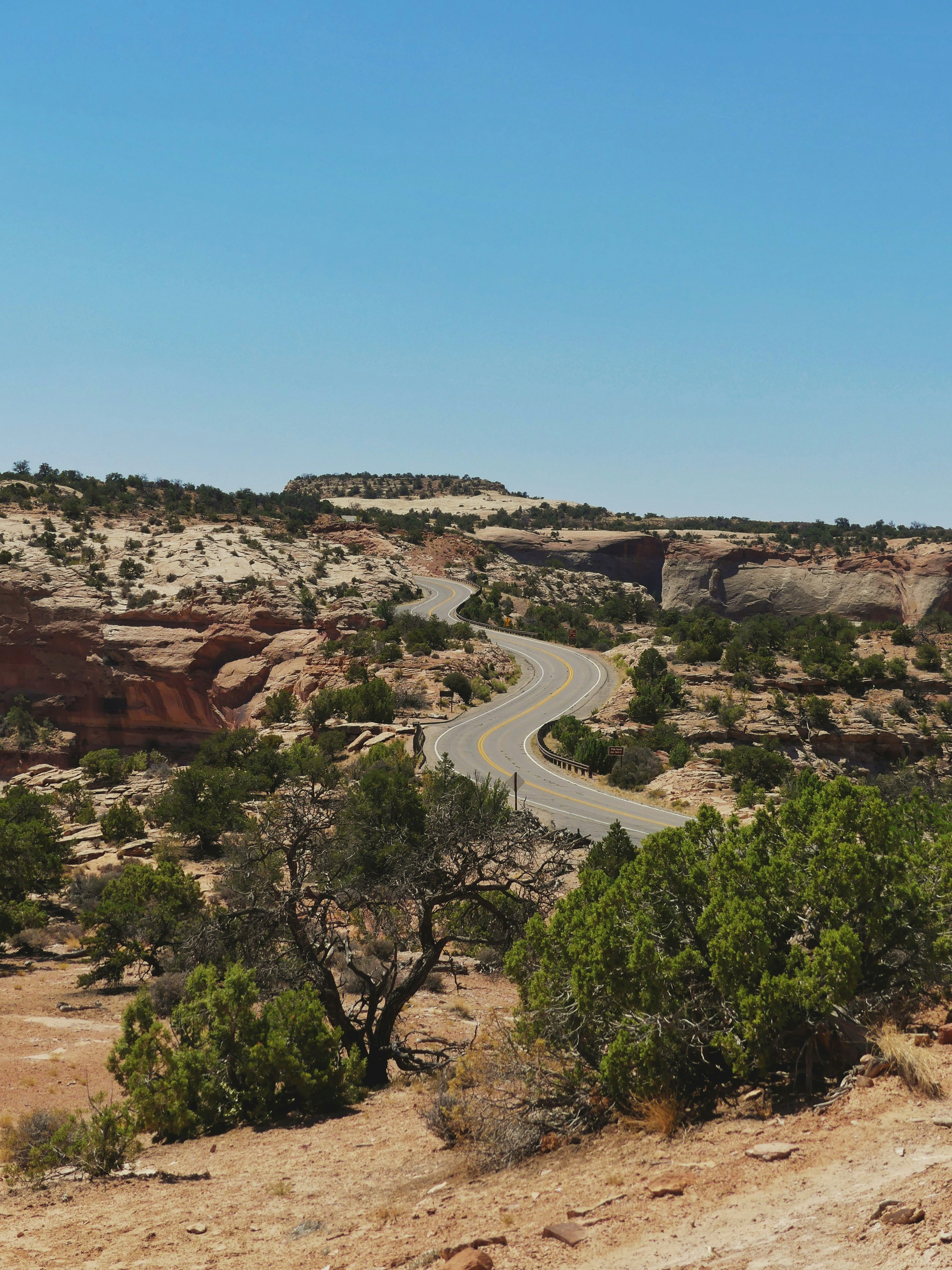 Winding Desert Highway through Quiet Canyon