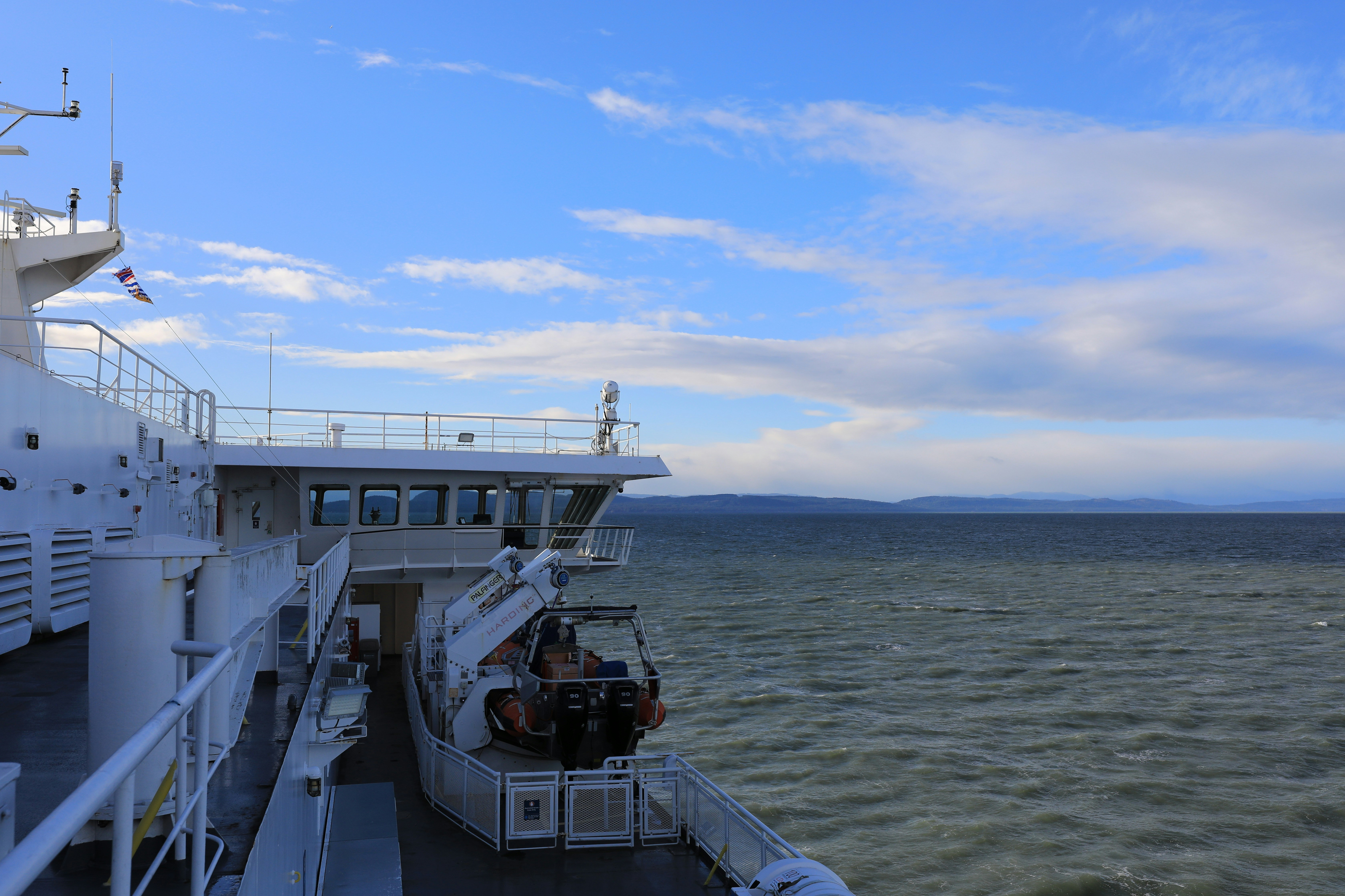 White Ship Deck Meets Ocean Horizon