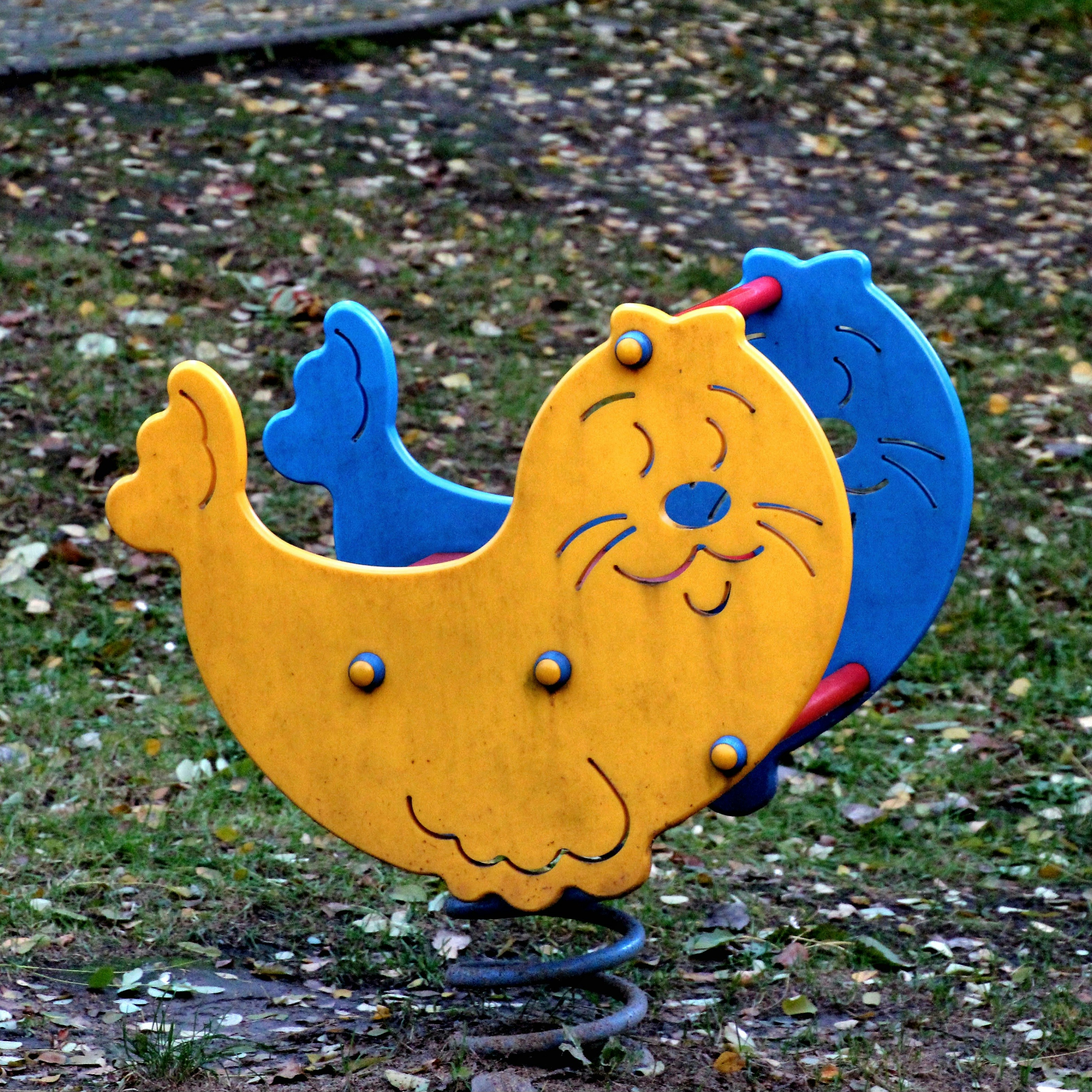 Colorful Yin-Yang Caricature Seat: Two Playful Cats in Mid-Spin