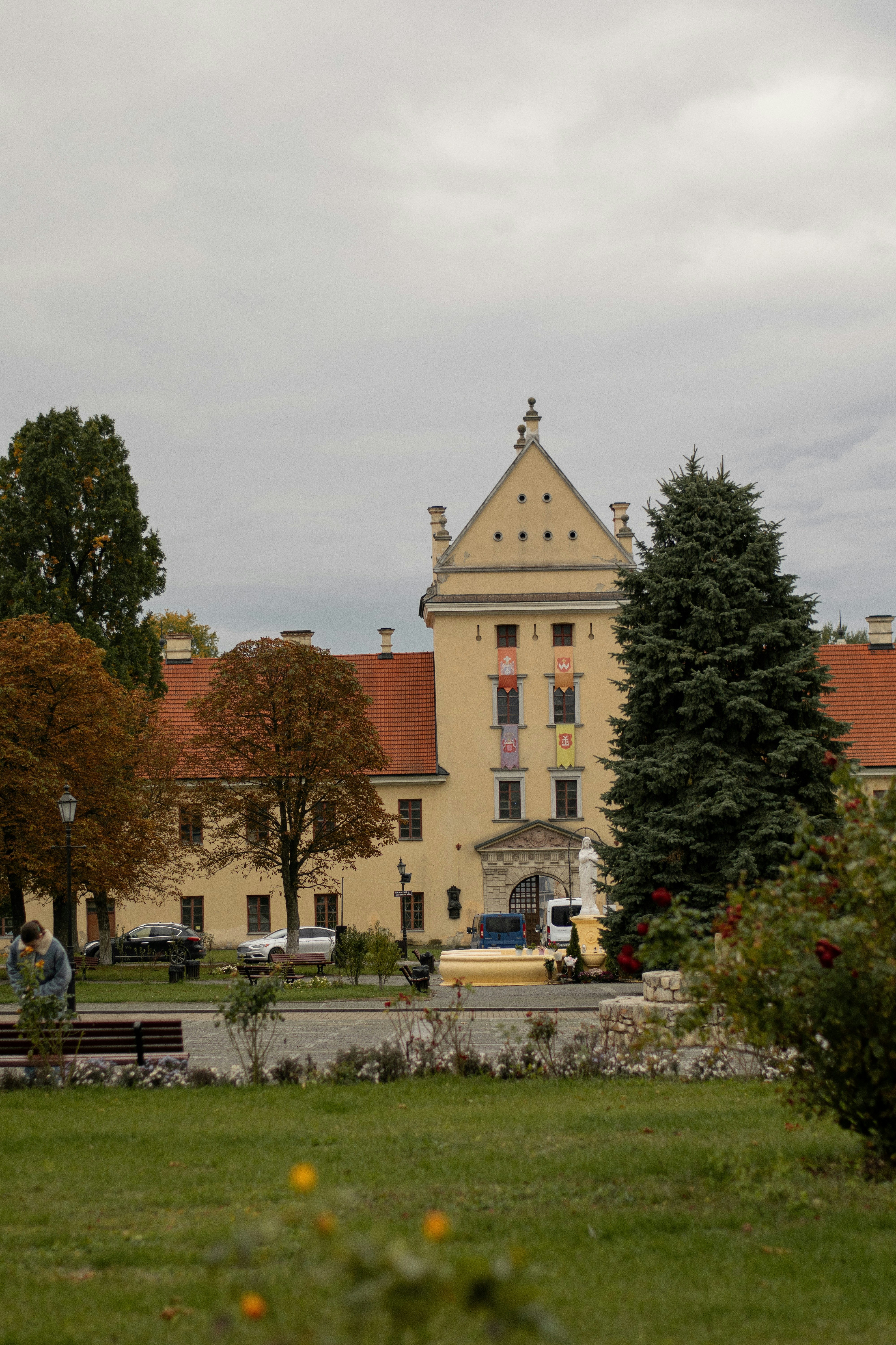 Heritage Gate: A Town Hall Framed by Autumn Trees