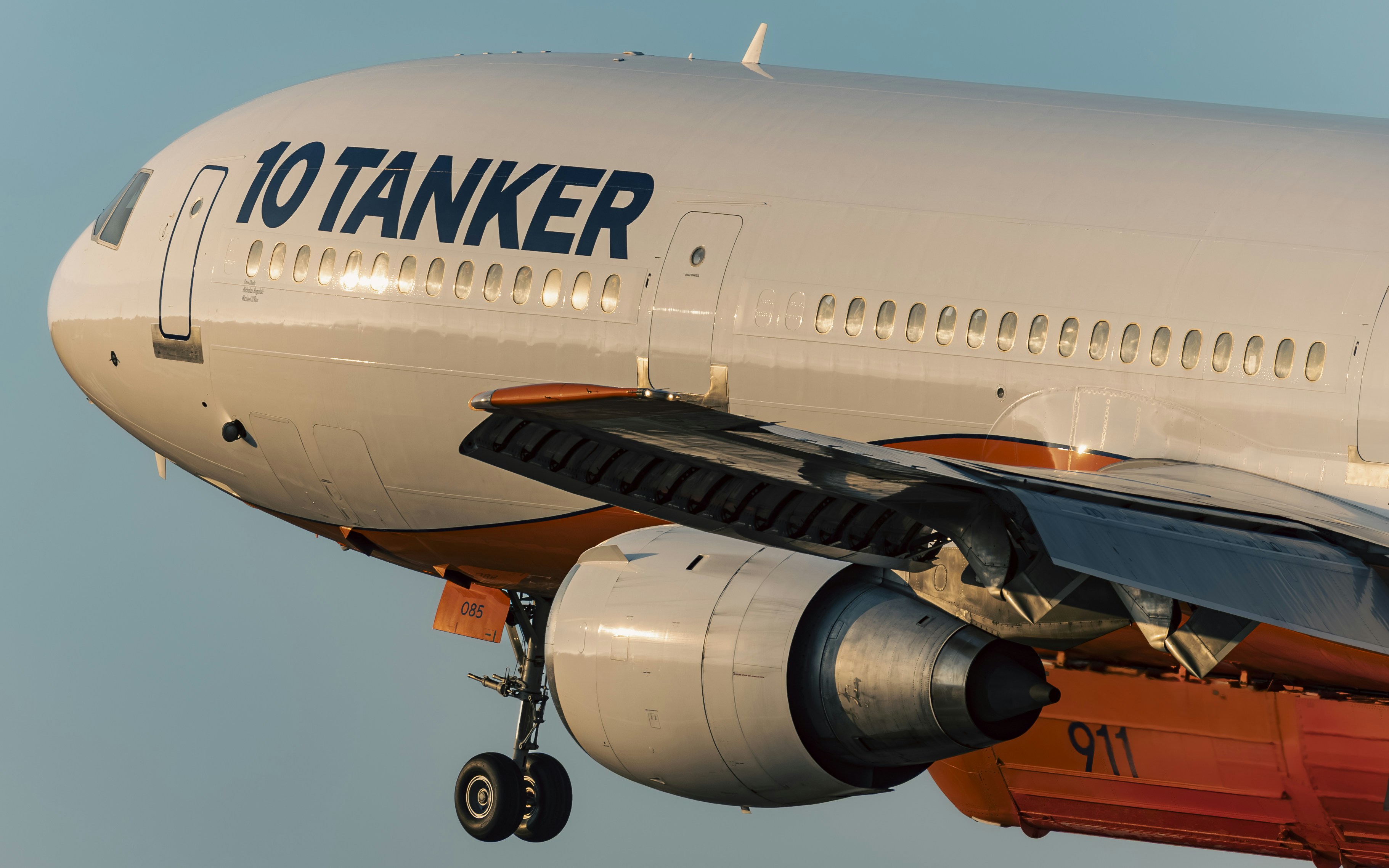 Smoke and Steel: A Tanker Jet's Determined Descent