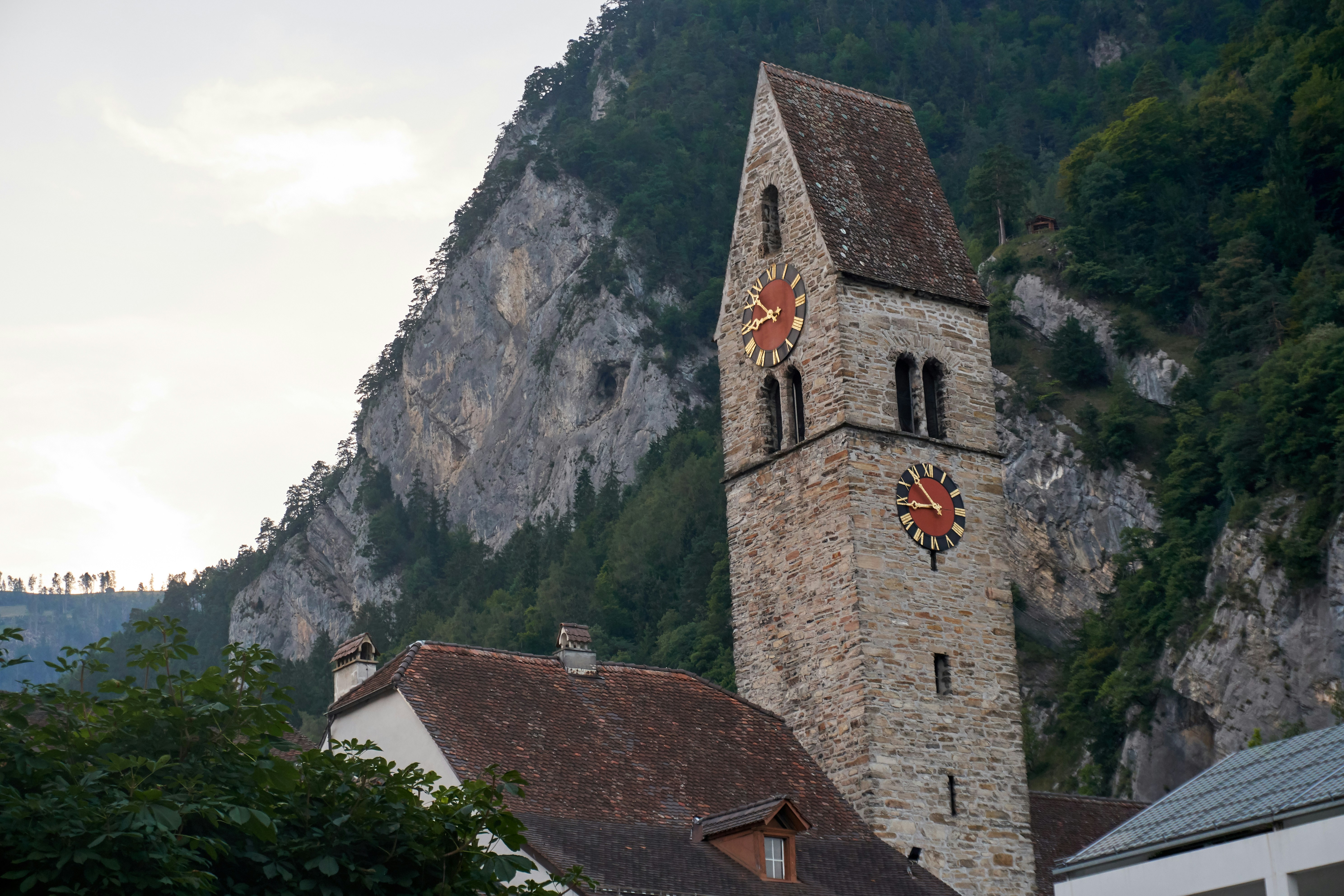 The Stone Bell Tower Reaching Toward a Shrouded Cliff