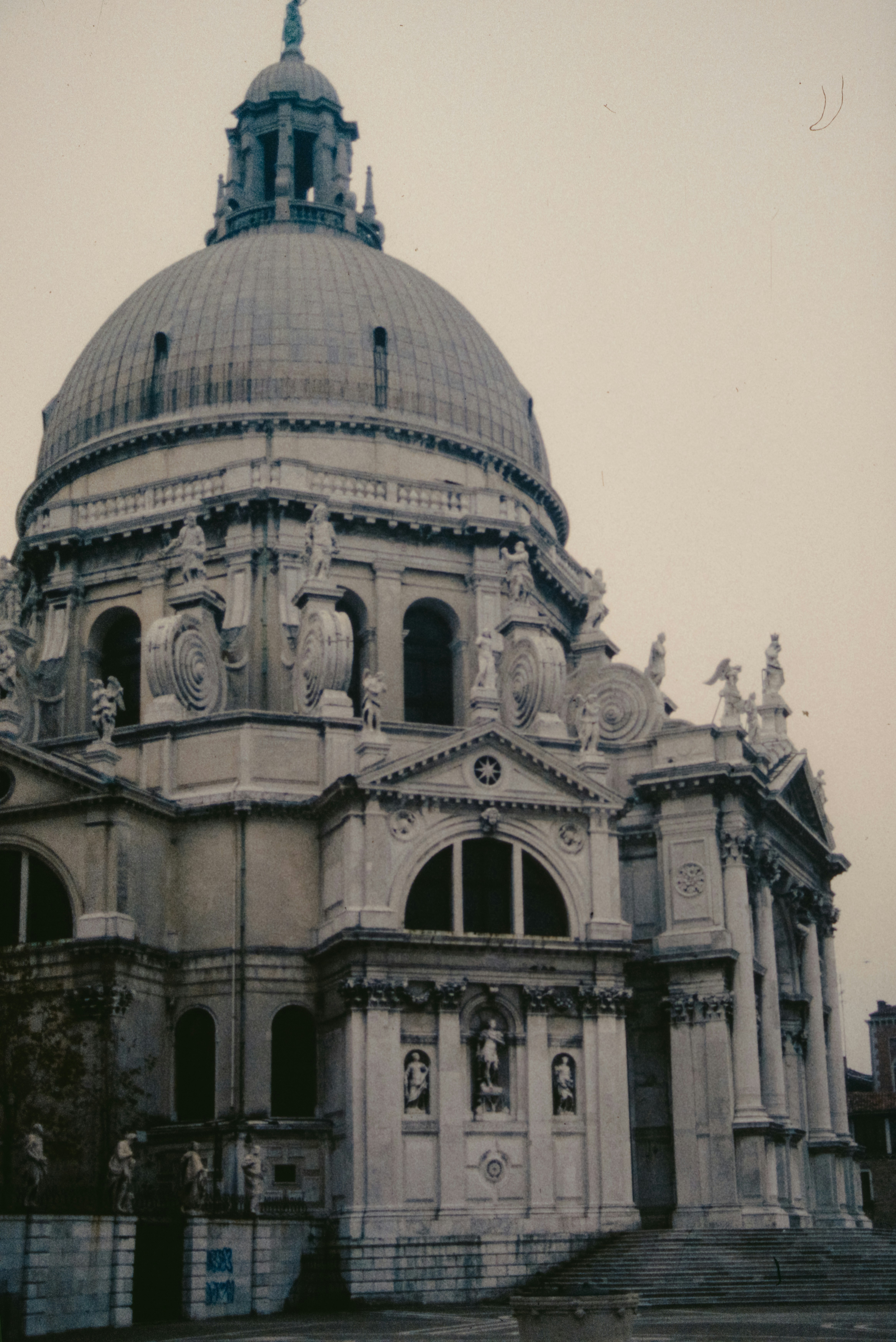 Domed Cathedral Facade: Stone Carvings and Sculpted Niches Up Close