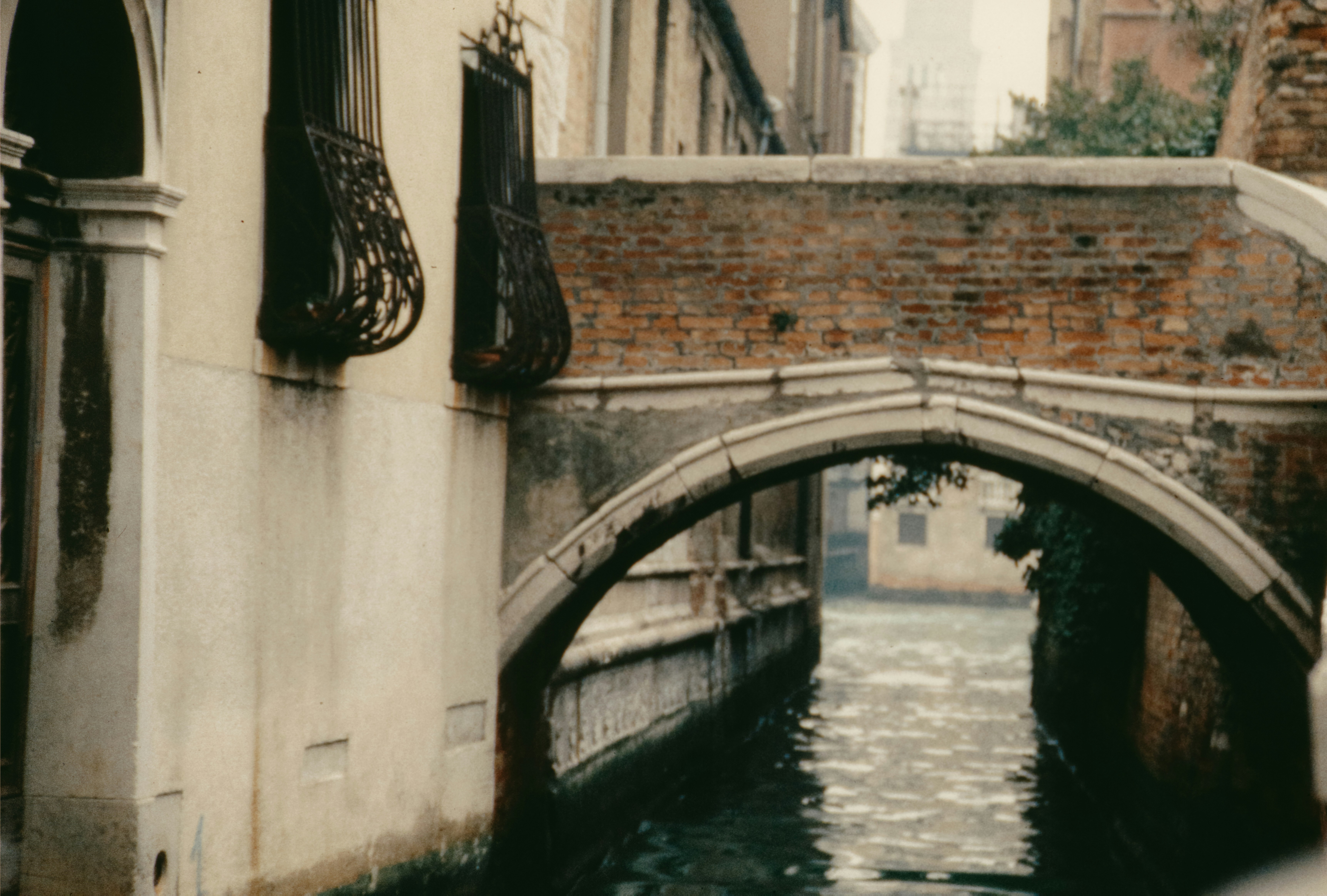 Bridge over a narrow Venetian-style canal