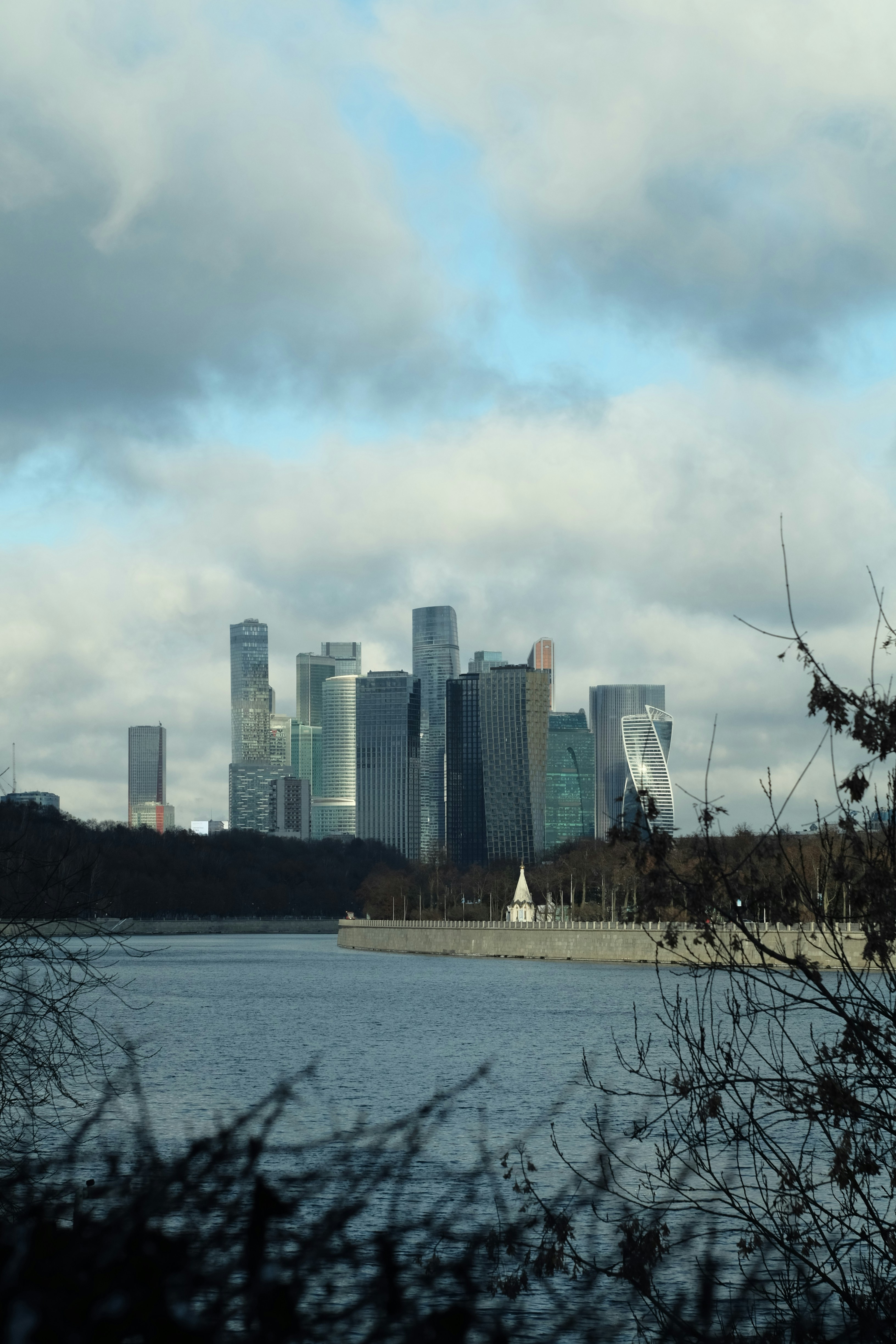 Rising Skyline Beyond the Riverbank