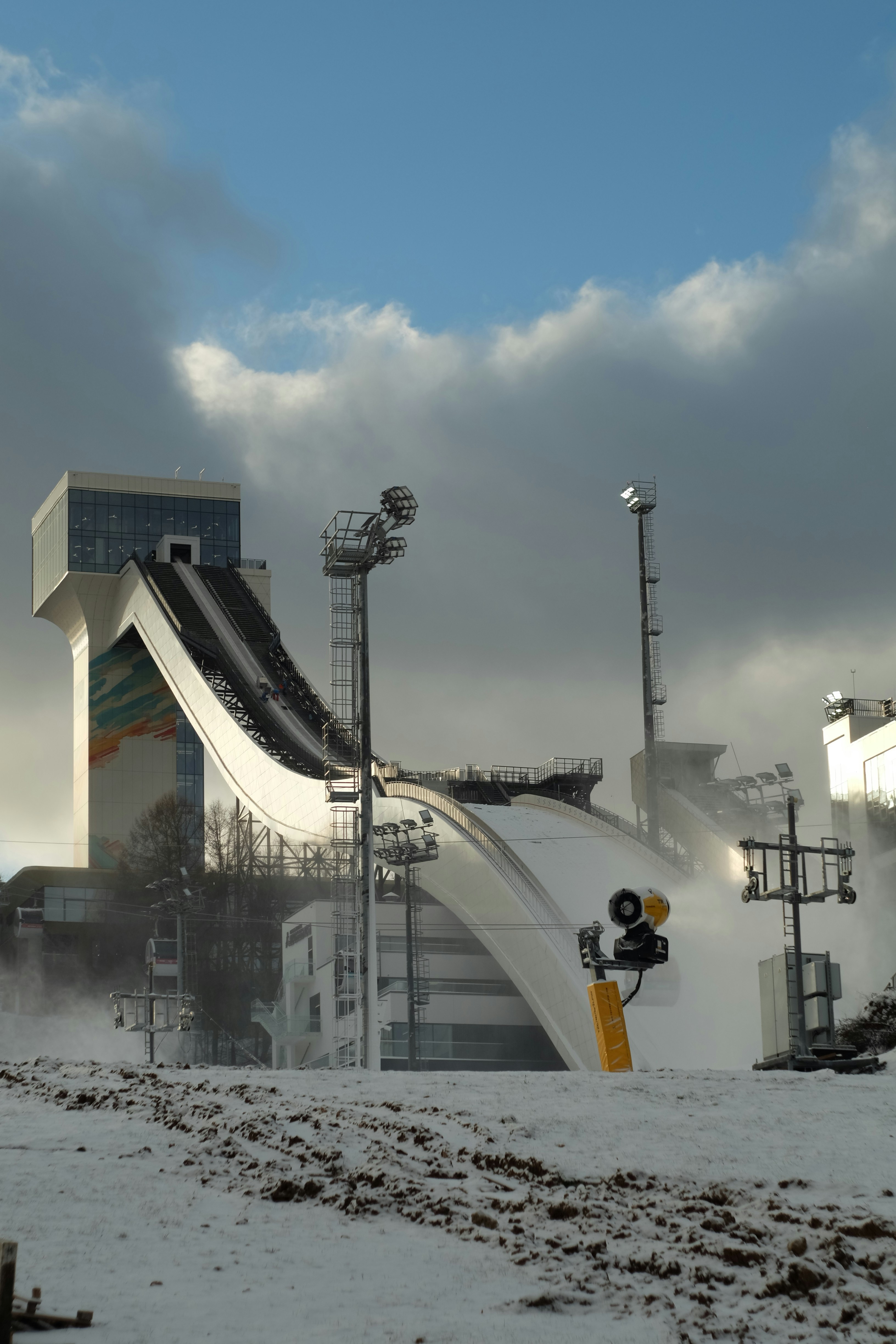 Snowbound Jump Arena: A Modern Ski Slope Under Overcast Skies