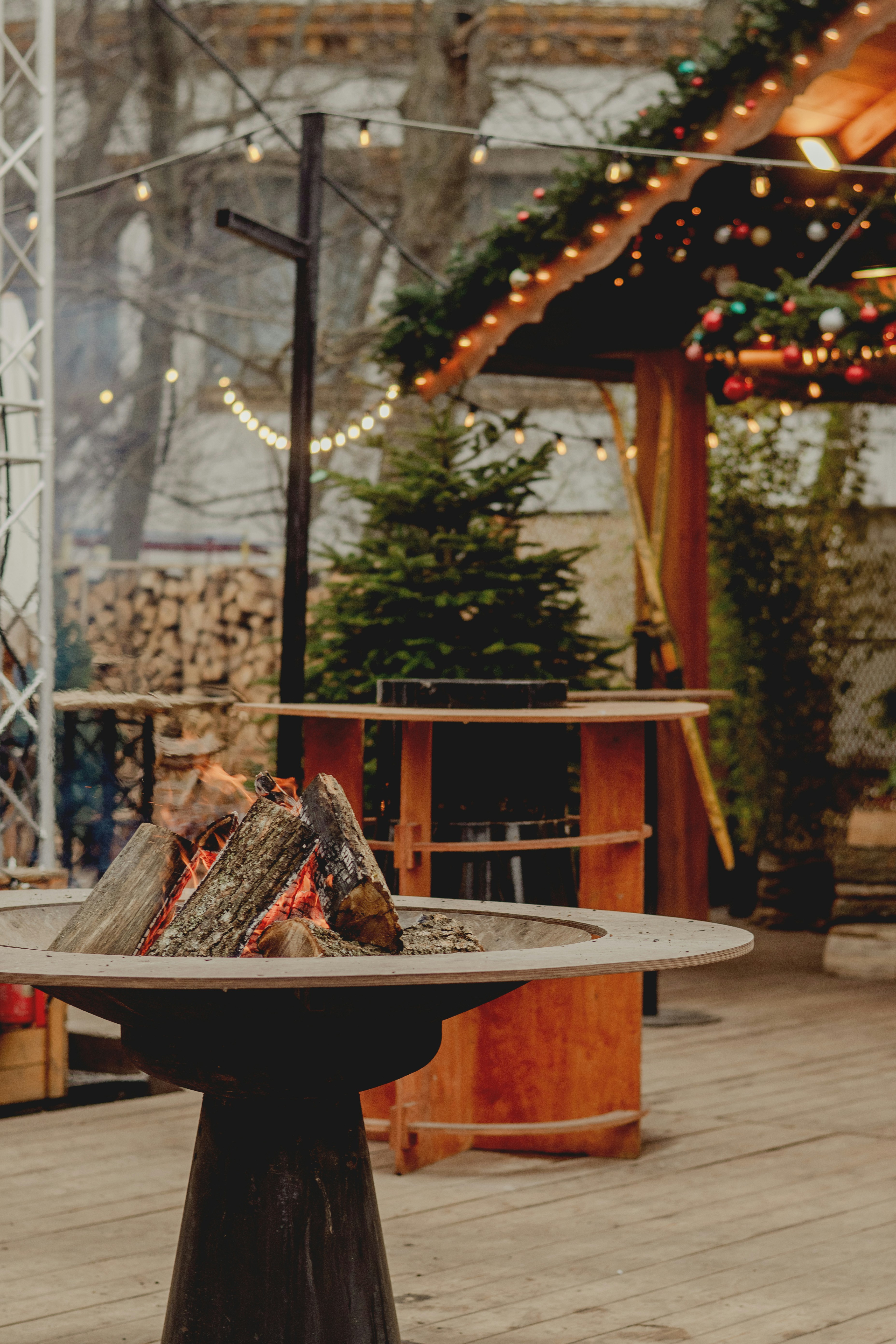 Warm Fire Pit Backdrop at a Festive Outdoor Market