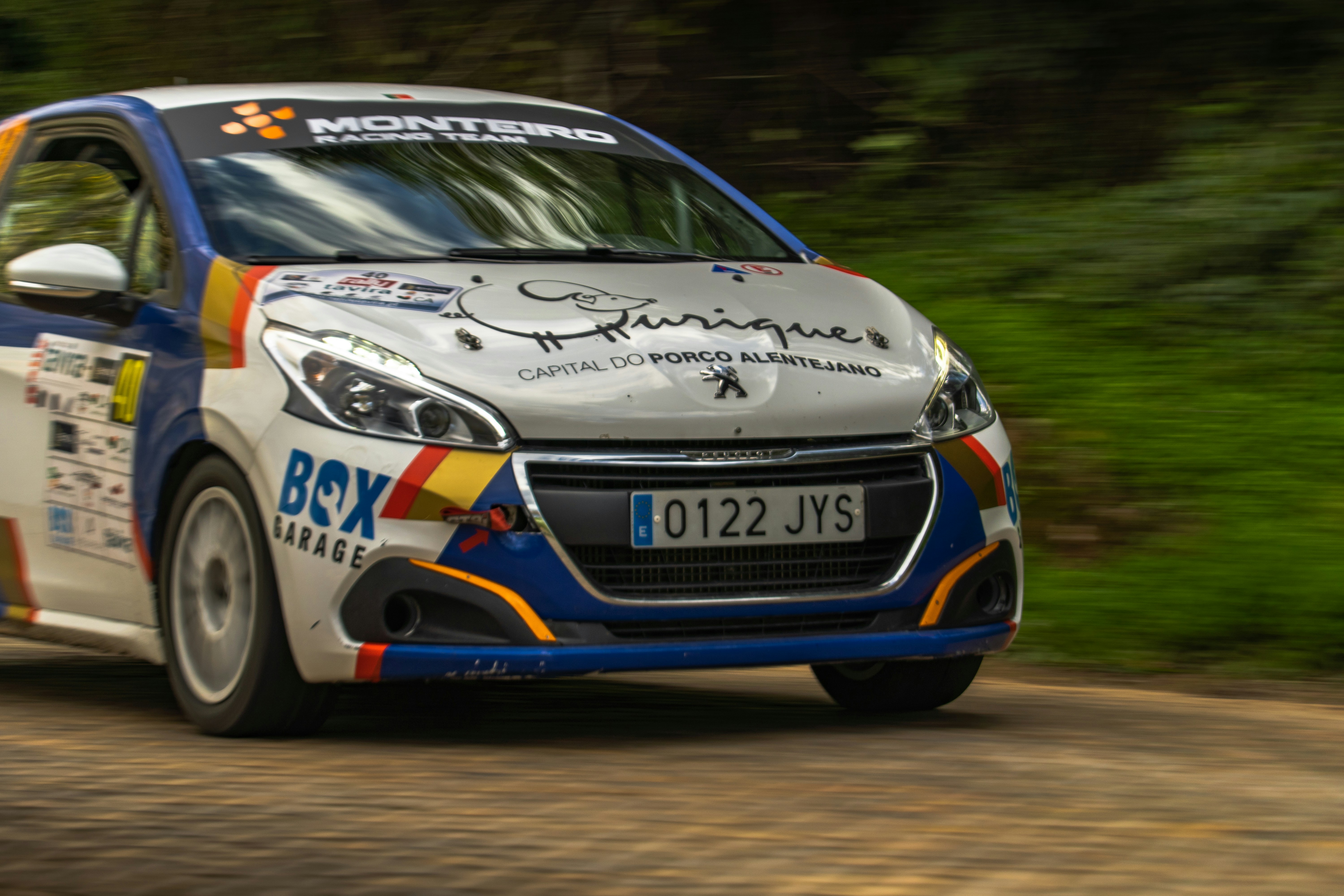 Front-Quarter Rally: Motion Blur and Color on a Peugeot Trusty