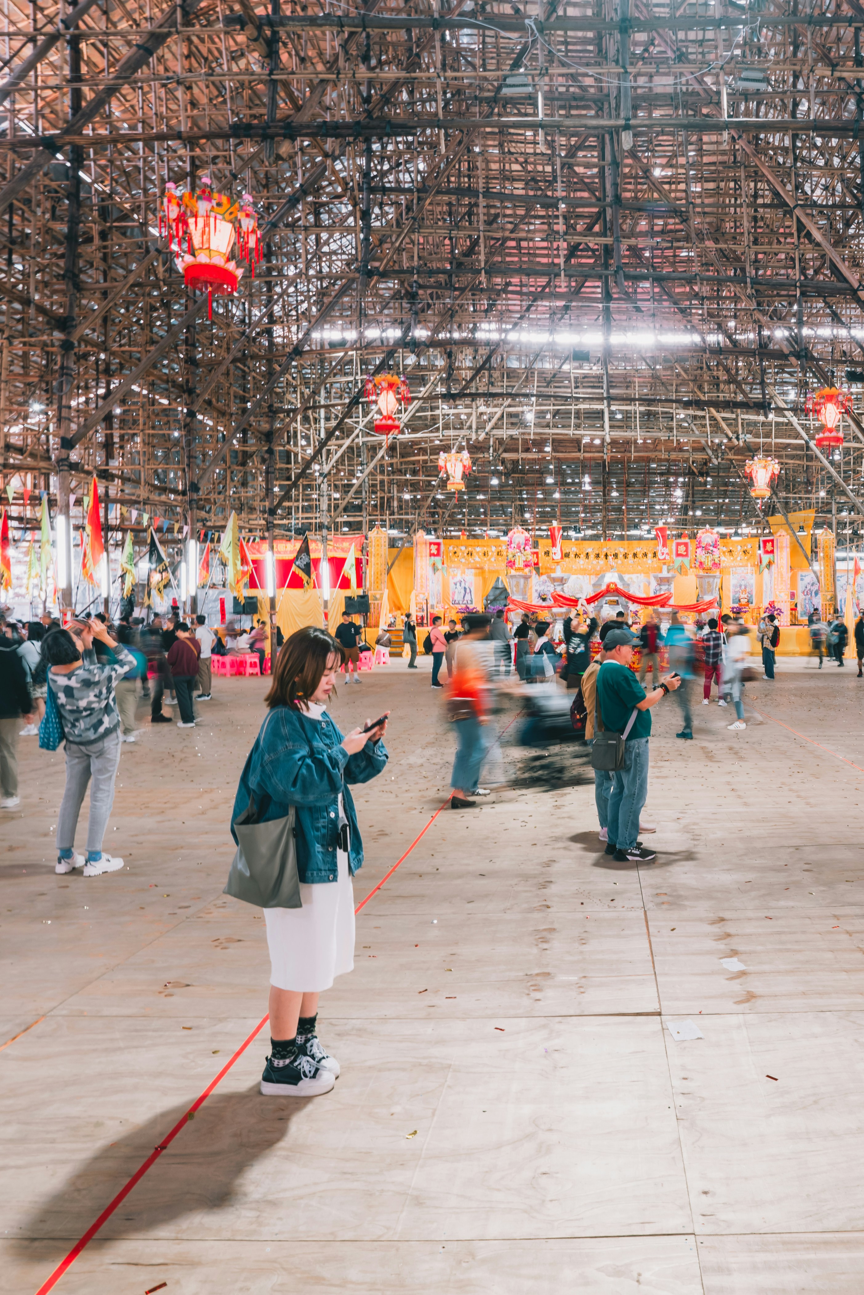 Lonely Stroll Under the Lanterns in a Festival Hall